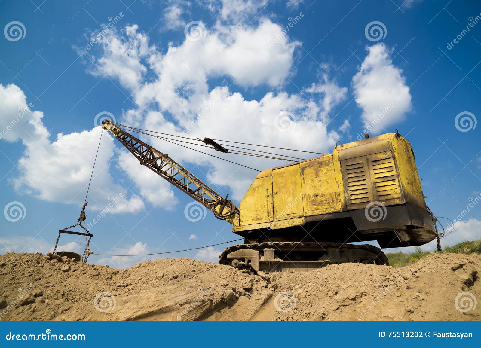 Excavator produces clay stock photo. Image of manual - 75513202