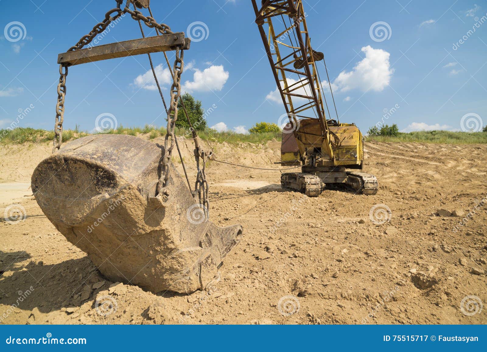 Excavator produces clay stock image. Image of development - 75515717