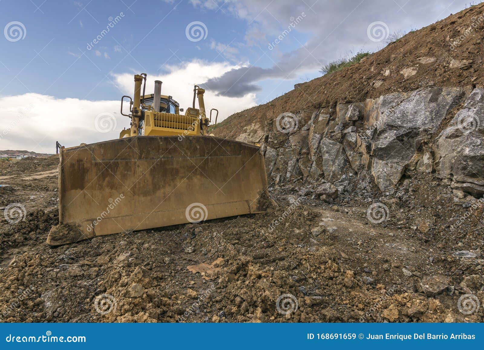 Excavator Pushing Rock in an Open Pit Mine Stock Image - Image of land ...