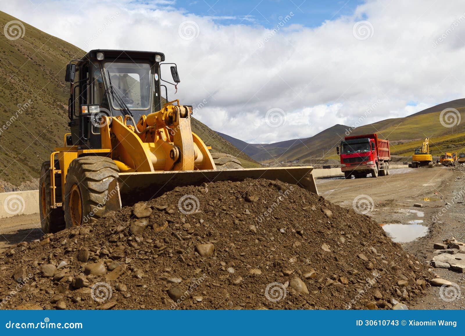 Excavator in road stock image. Image of excavation, hole - 30610743