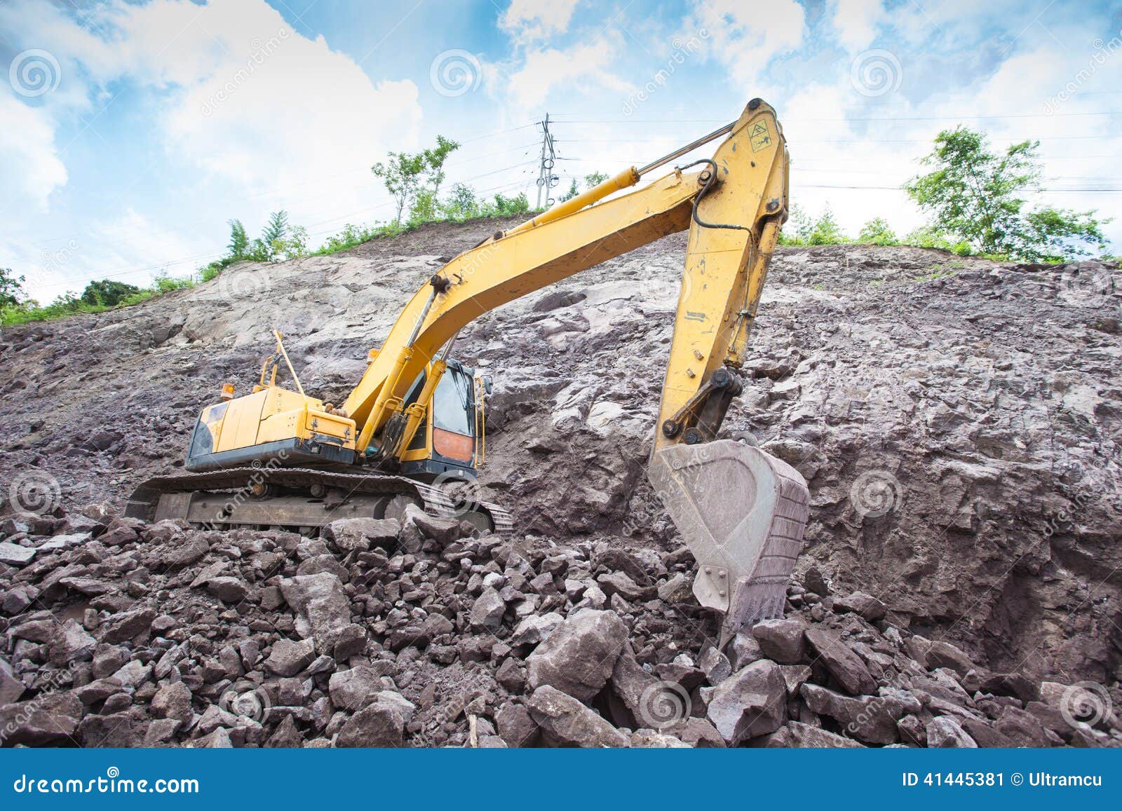 Excavator in the rock mine stock image. Image of mining - 41445381