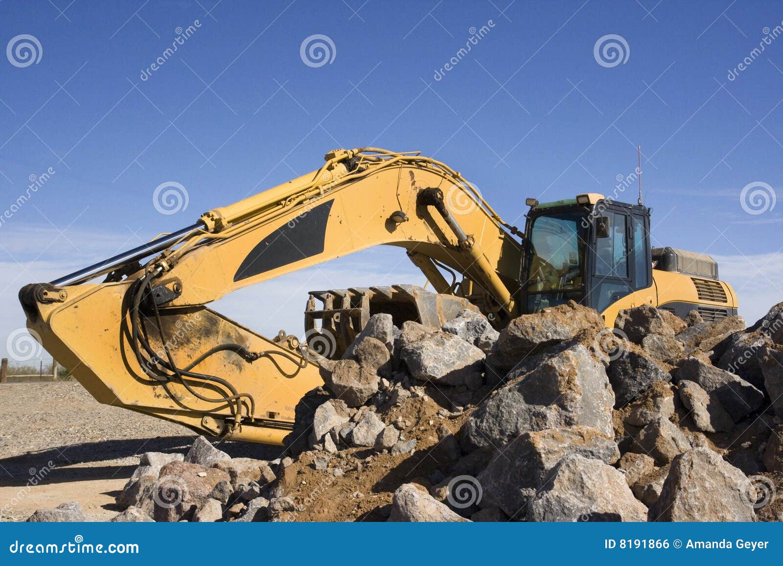 Excavator with rocks stock photo. Image of rock, dirt - 8191866