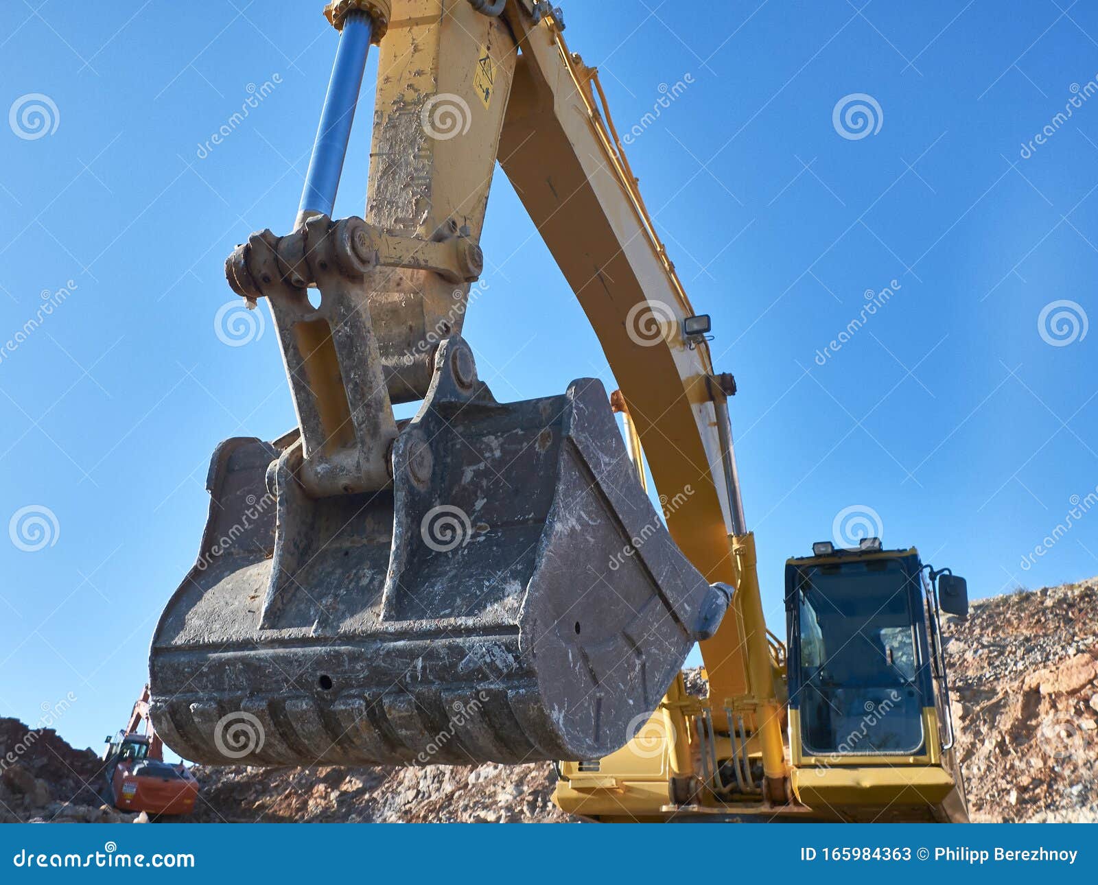 Excavator Scoop during Road Construction on the Rocky Soils Stock Image ...