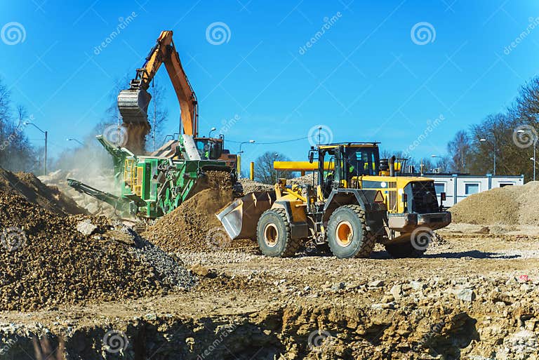 Excavator and Screener Machine Stock Image - Image of machines, loading ...