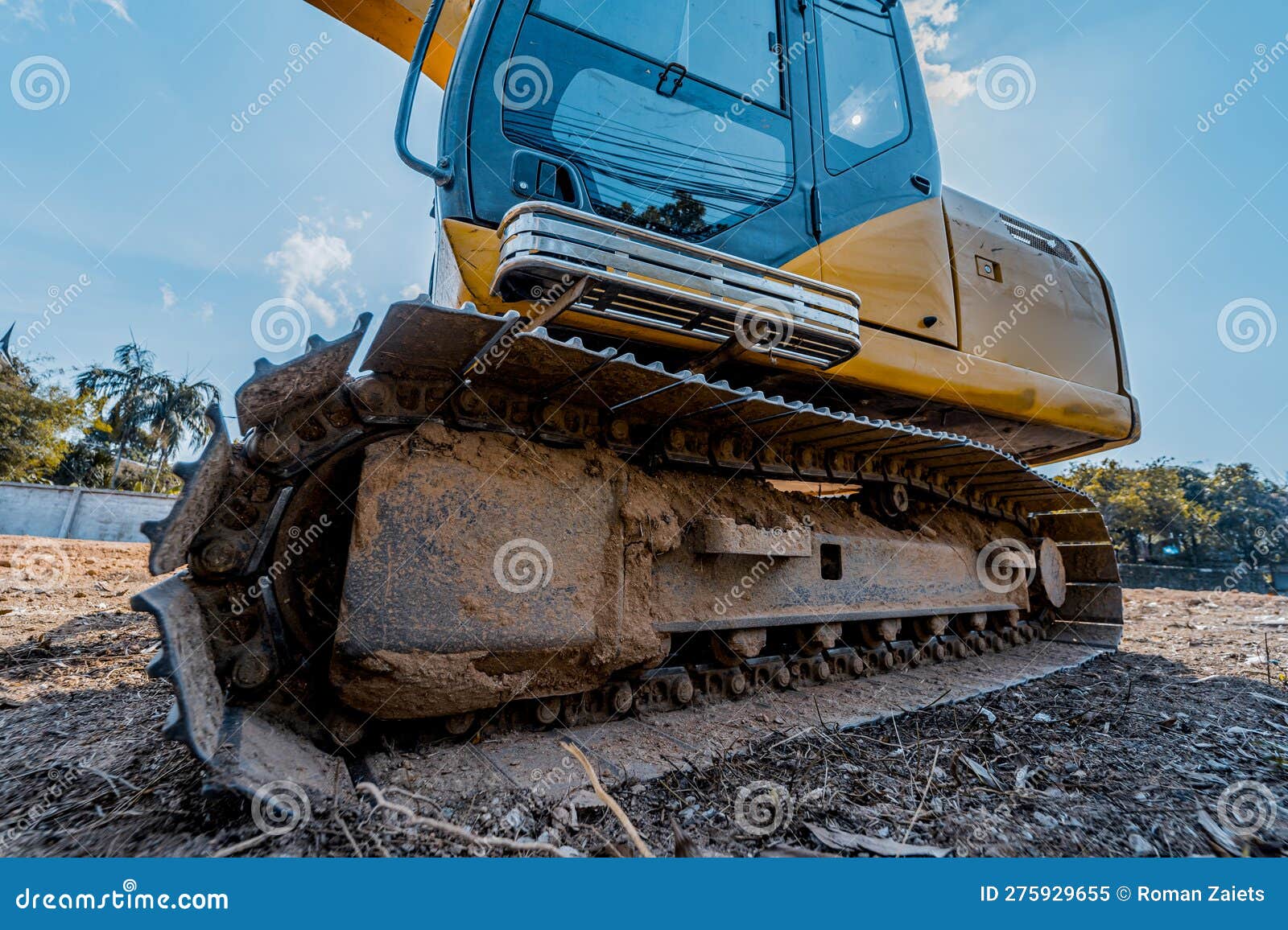 Excavator with Shovel Digs the Ground for the Foundation at Constuction ...