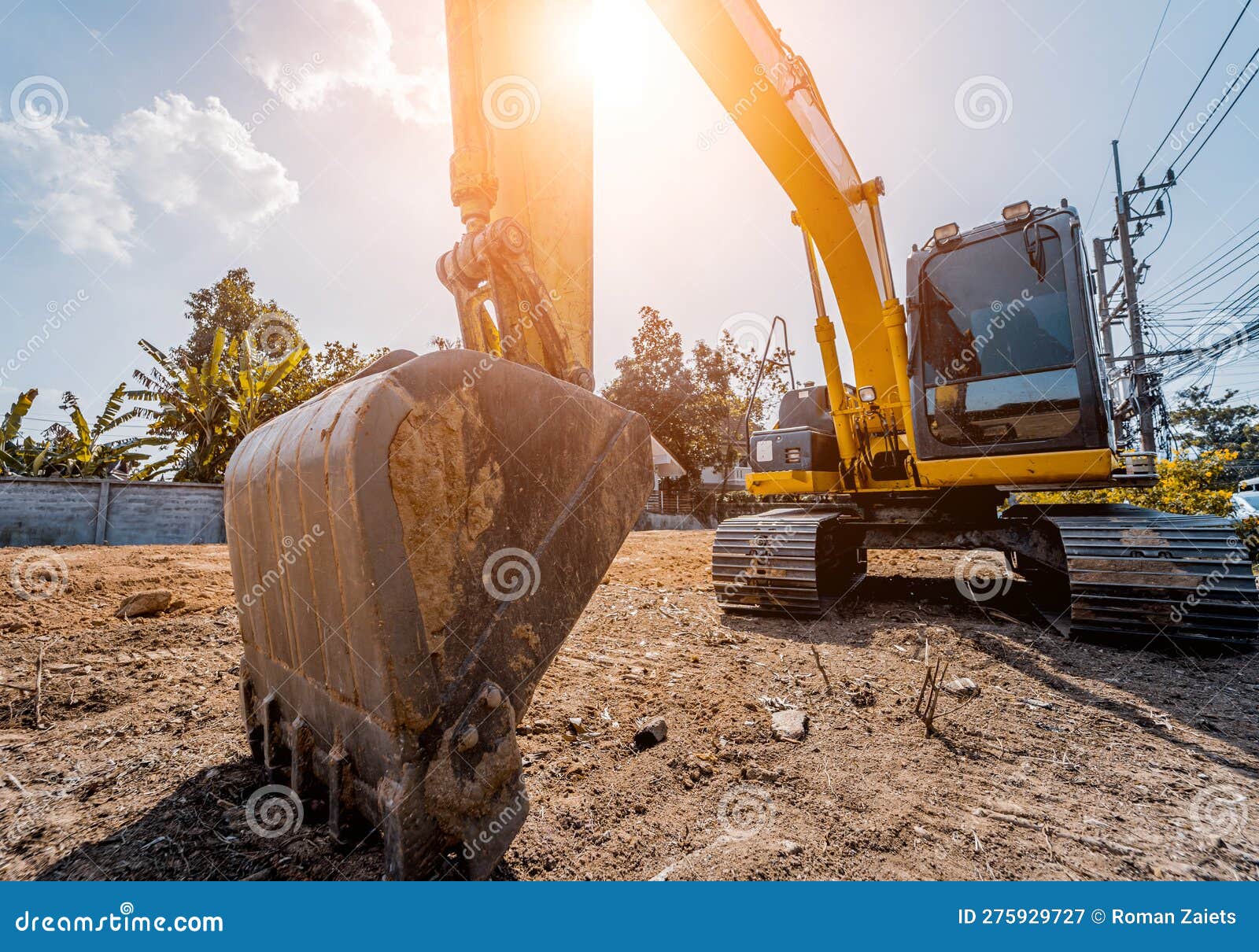 Excavator with Shovel Digs the Ground for the Foundation at Constuction ...