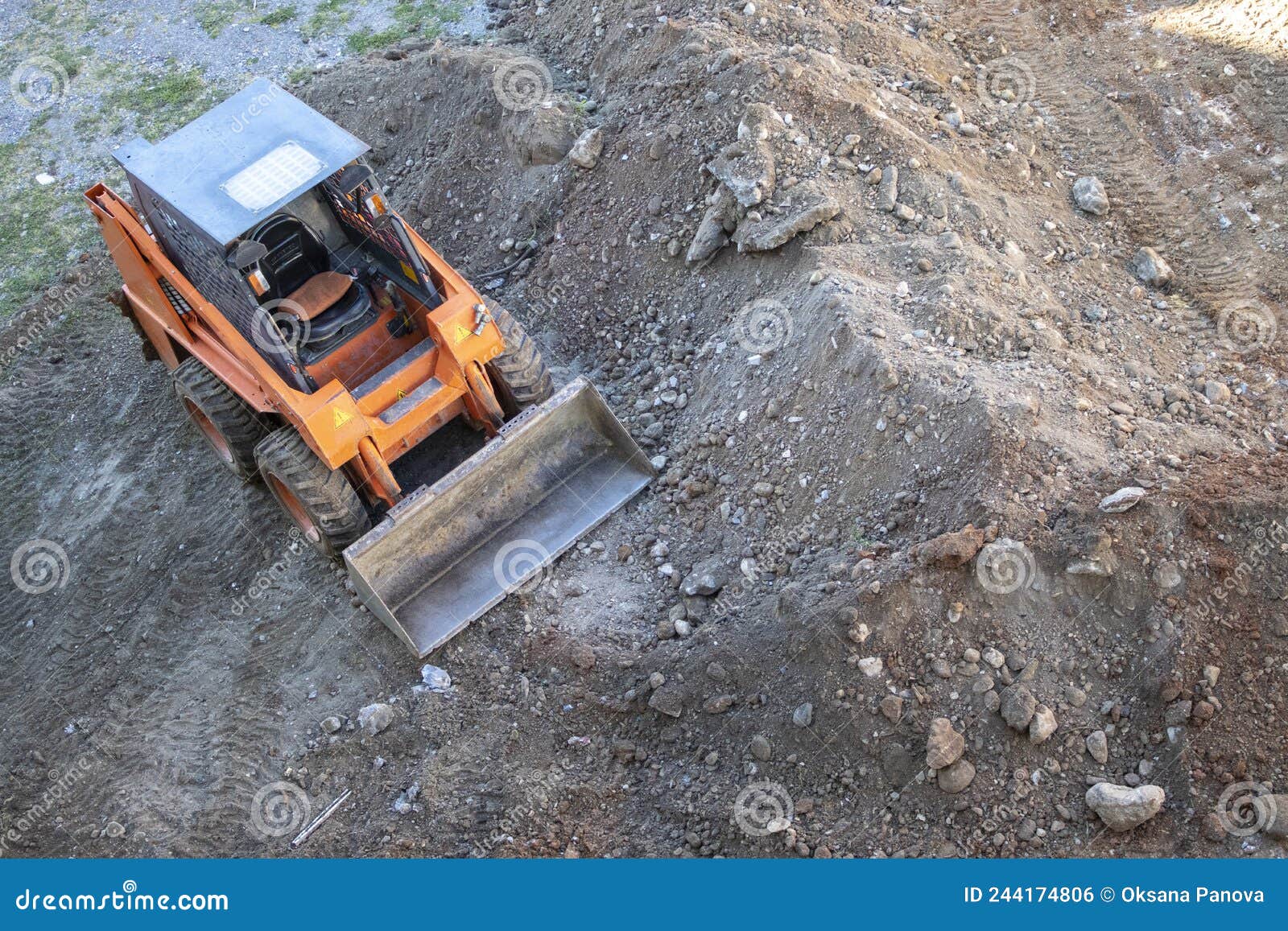 Excavator on the Site during Earthworks. Tractor Works at the ...