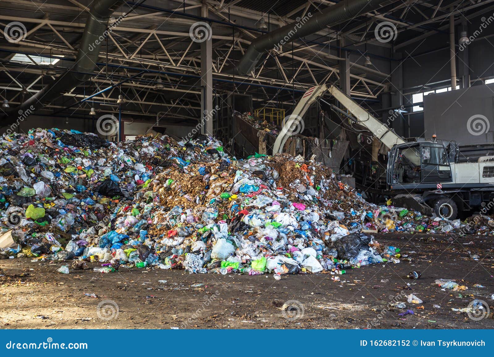 Excavator Stacks Trash in Big Pile at Sorting Modern Waste Recycling ...