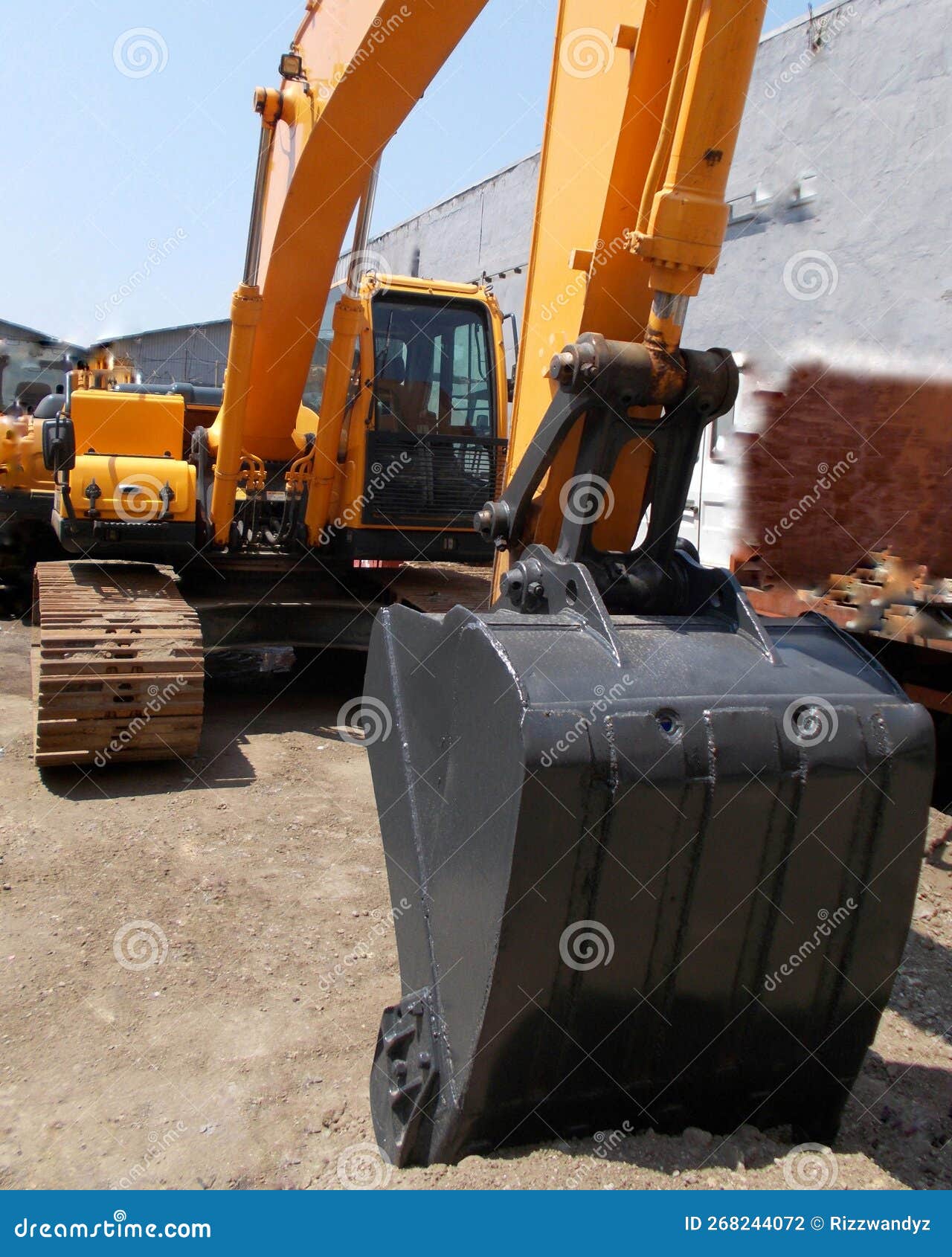 Excavator Stand by on the Warehouse Stock Photo - Image of wheel ...
