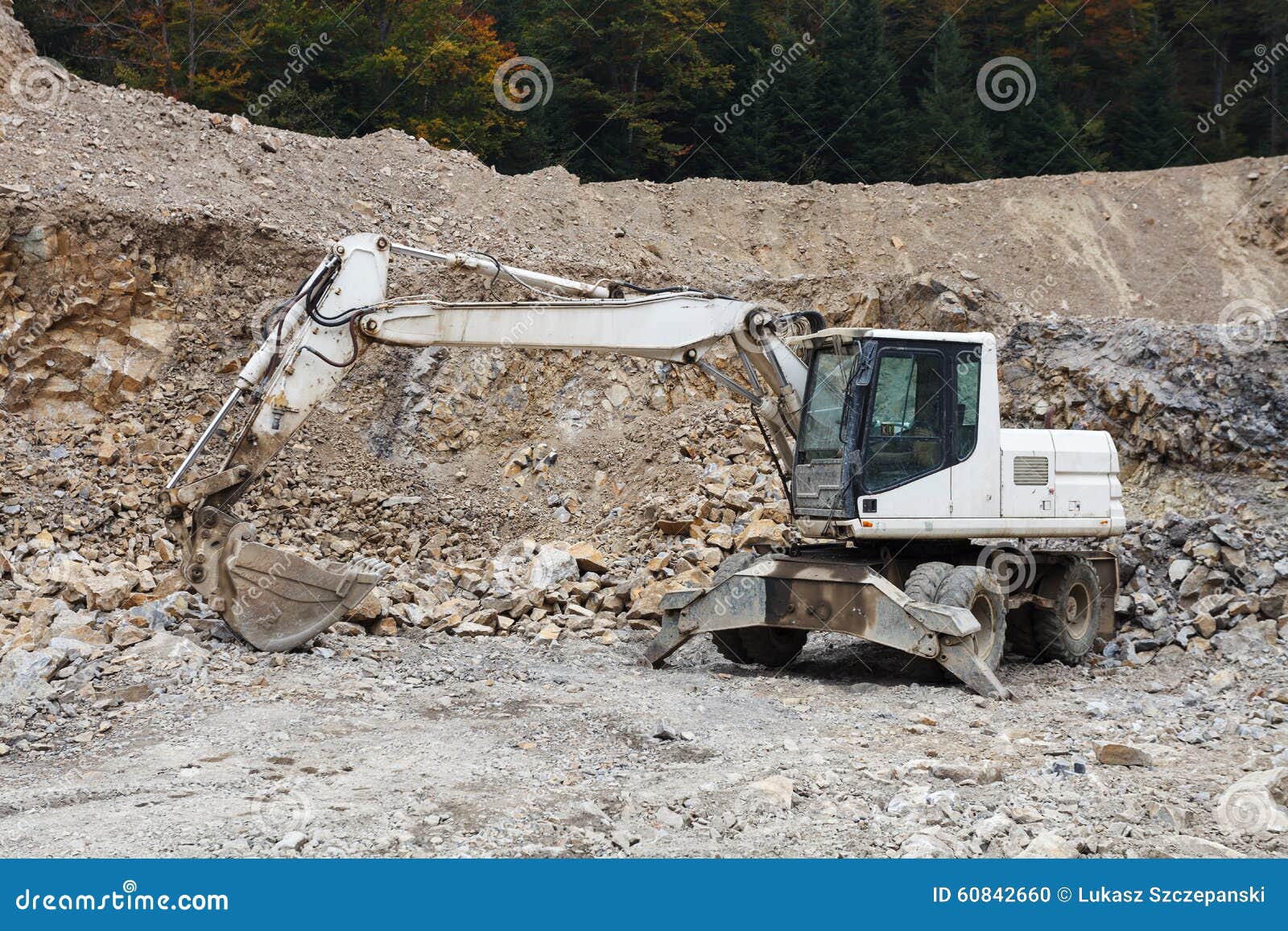 Excavator in a stone-pit stock photo. Image of quarry - 60842660