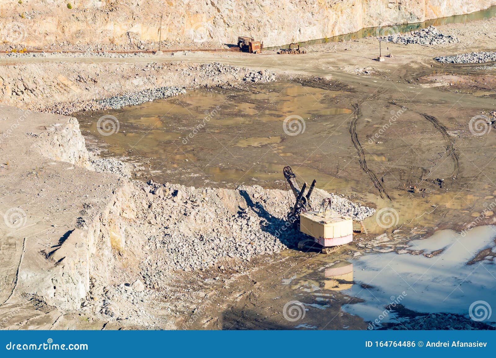 Excavator in a Stone Quarry for the Extraction of Crushed Stone and ...