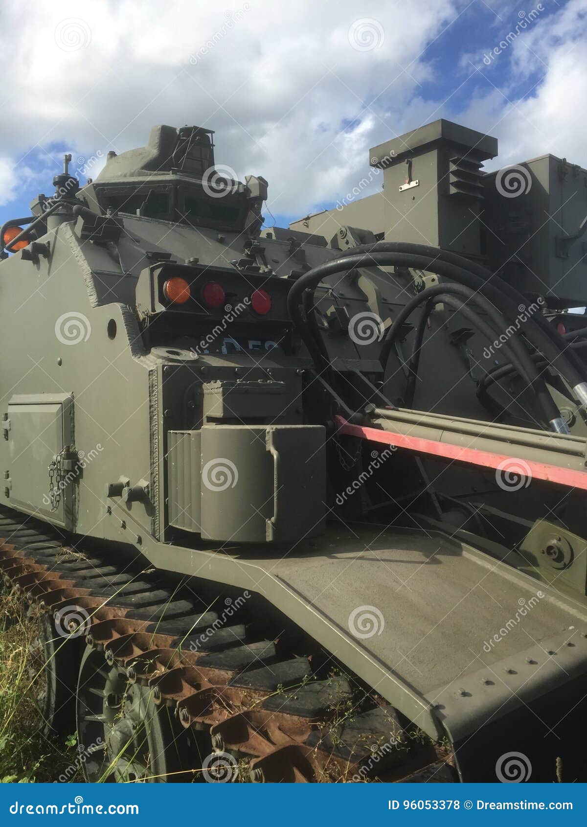 An Excavator Tank Under a Blue Sky Stock Photo - Image of outdoors ...