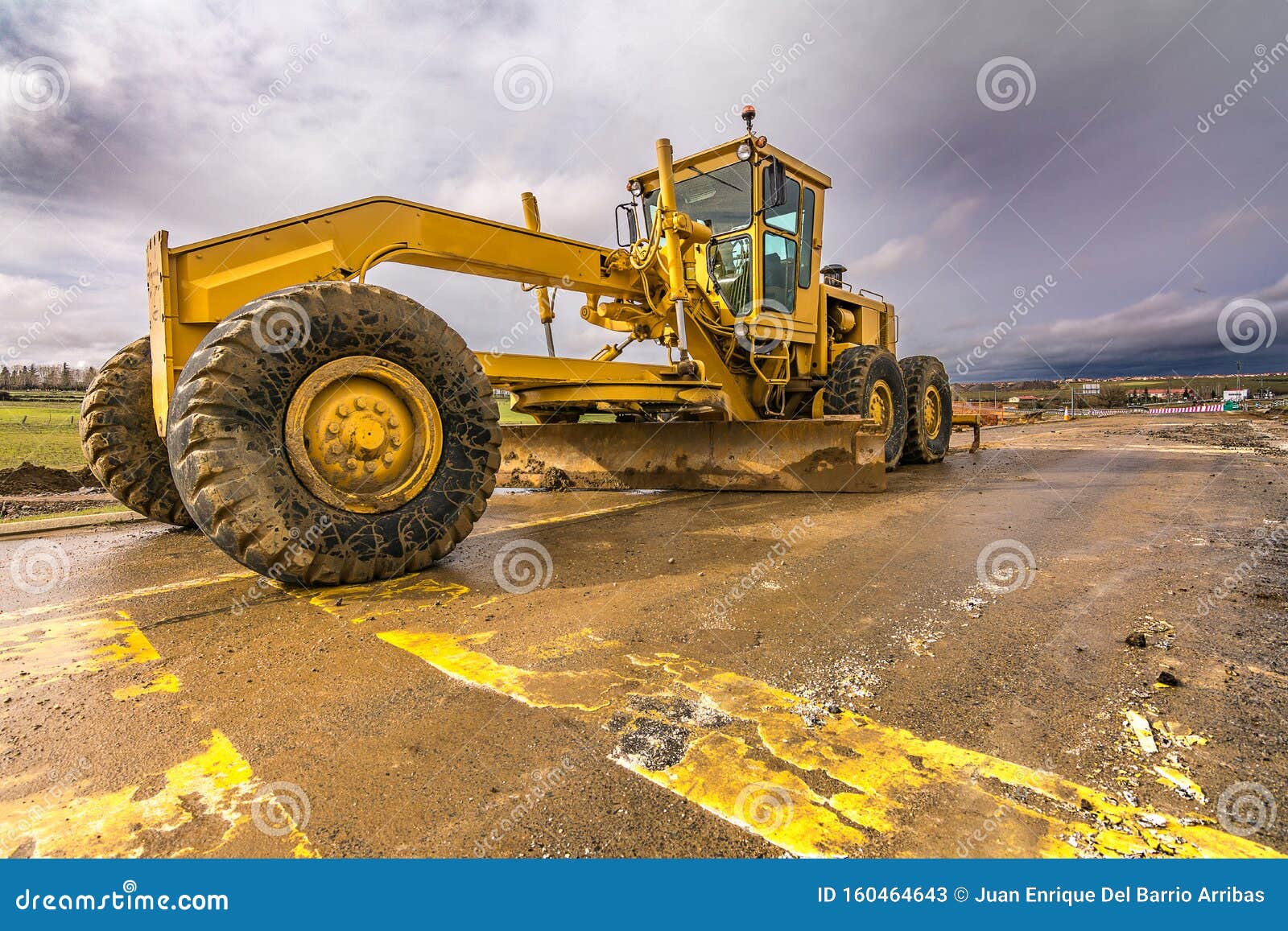 Excavator To Level and Smooth the Land in the Construction of a Road ...