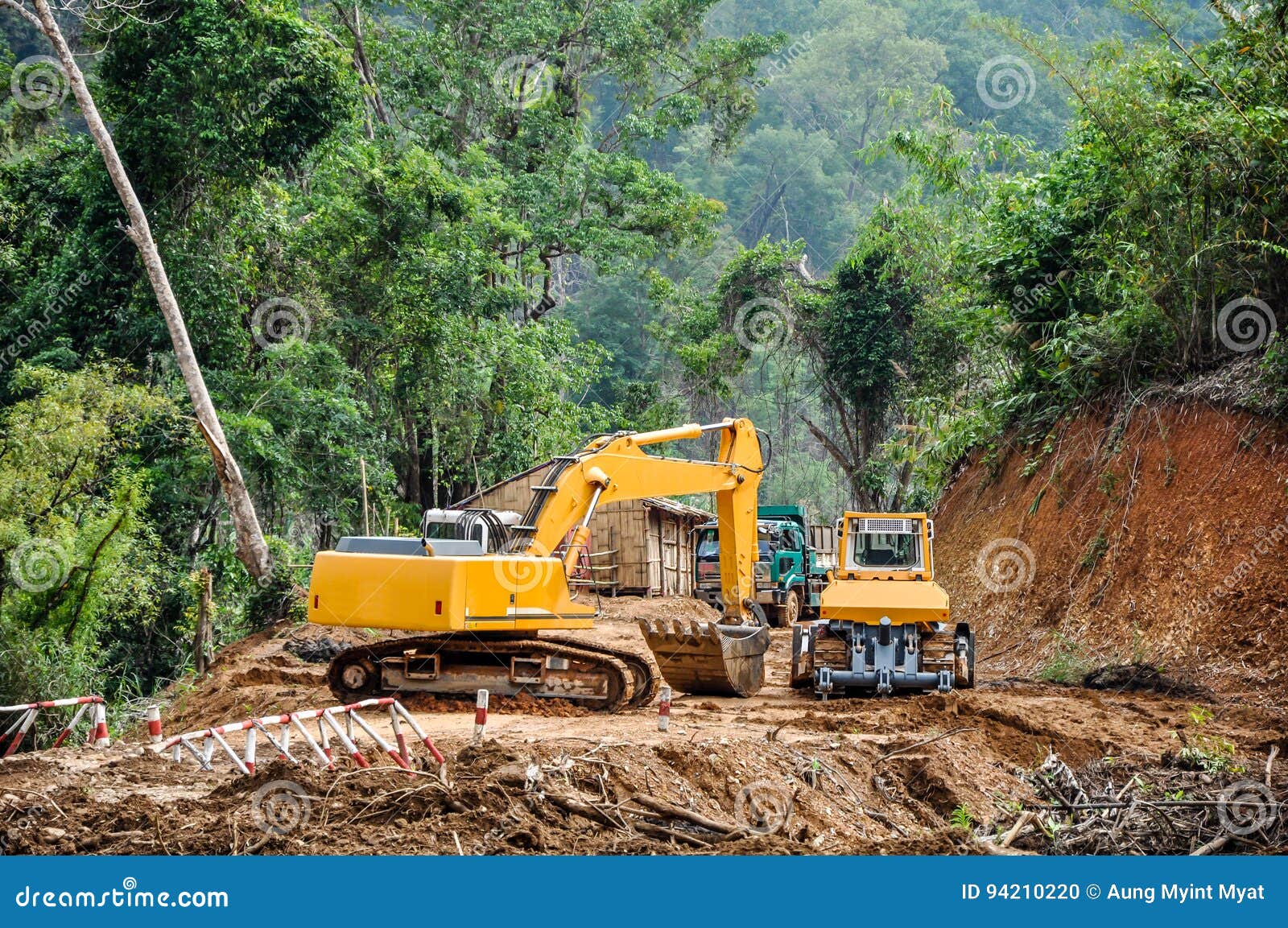 Excavator and Truck in the Road Construction Job, Countryside of ...