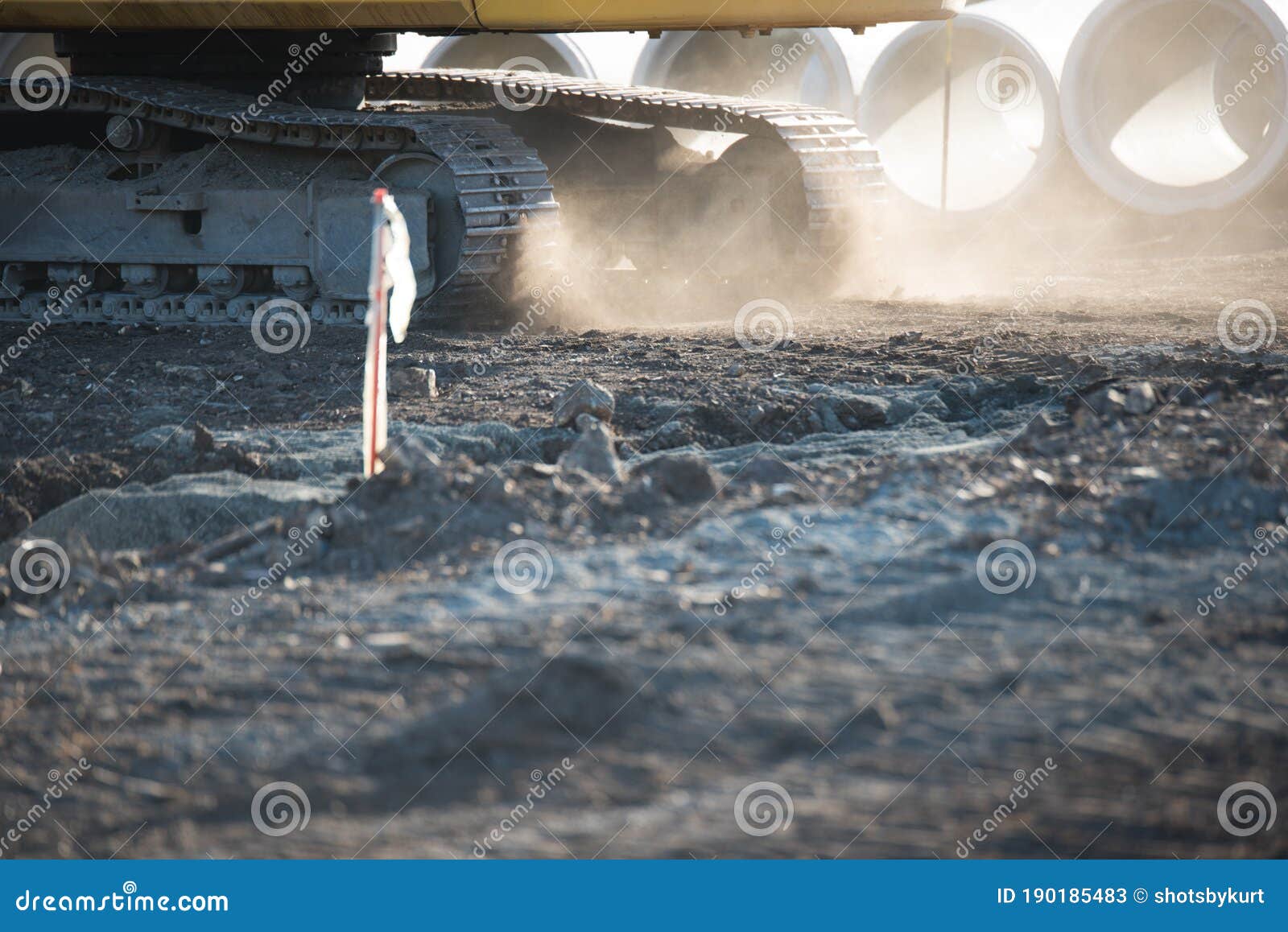 Excavator Tracks Putting Up a Dust Cloud Stock Image - Image of tracks ...