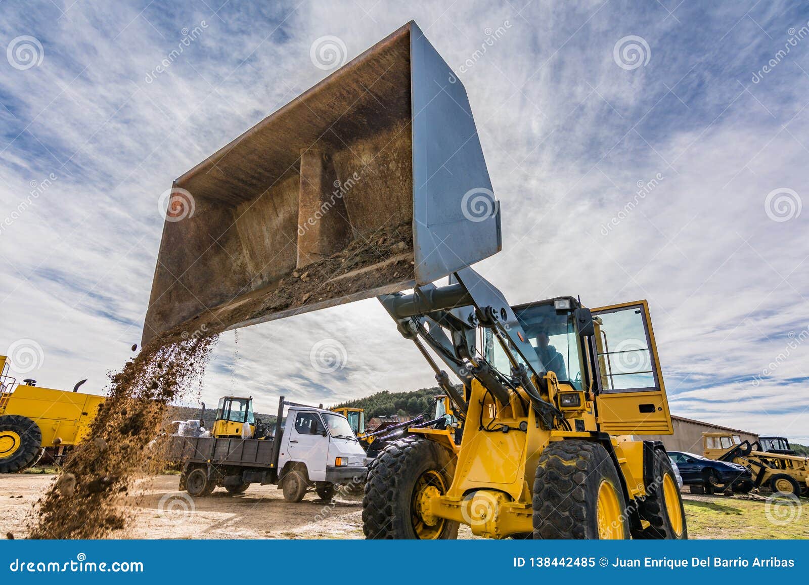 Excavator unloading sand stock image. Image of blue - 138442485