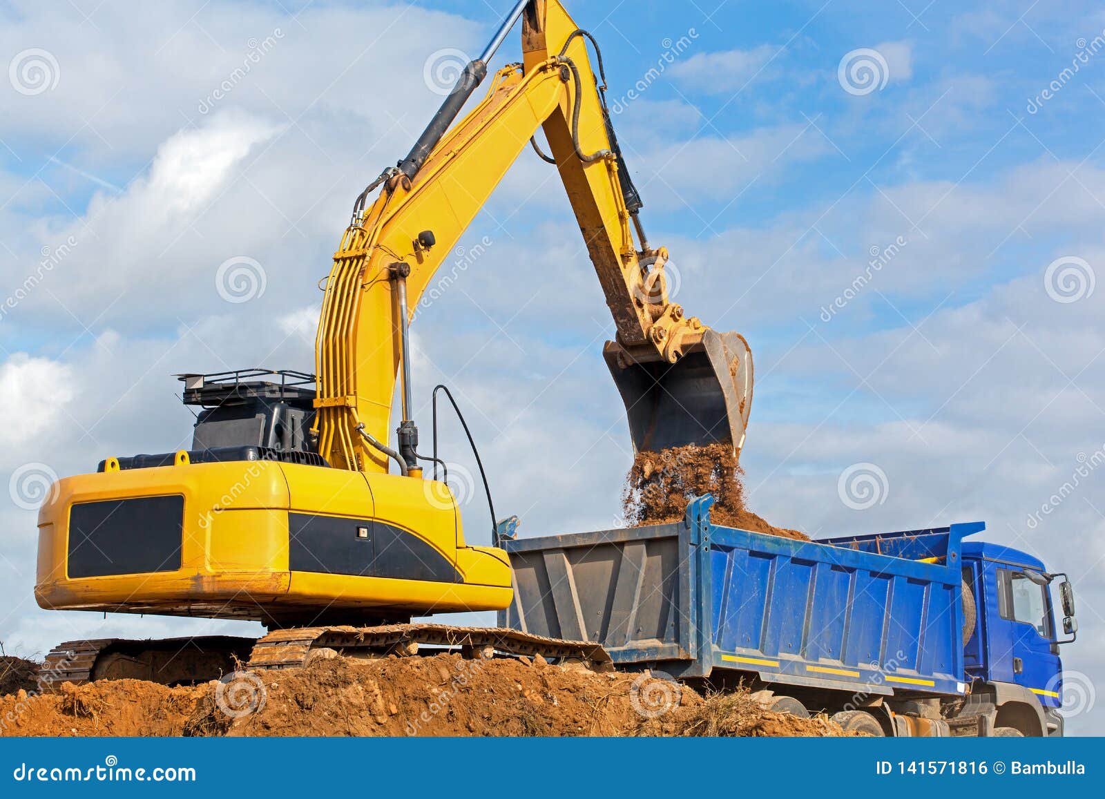 Excavator Unloading Sand into Tipper Truck Stock Photo - Image of ...