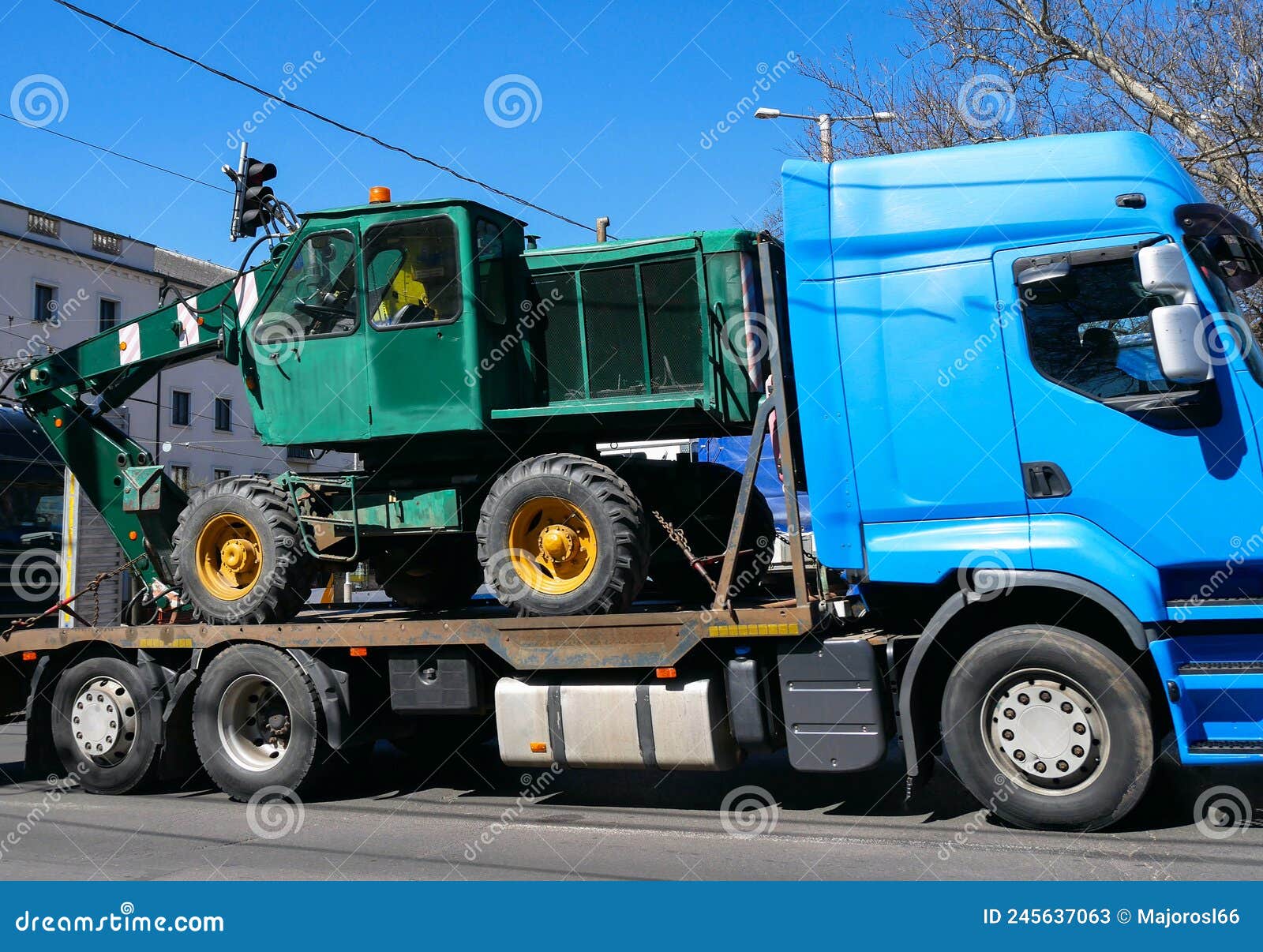 Excavator Vehicle on a Truck Stock Image - Image of side, frot: 245637063
