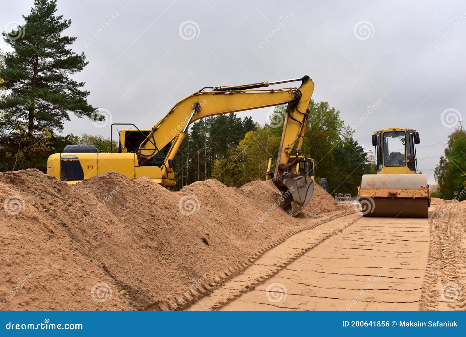 Leveling And Compaction Of Soil On The Construction Site. Modern Mini ...