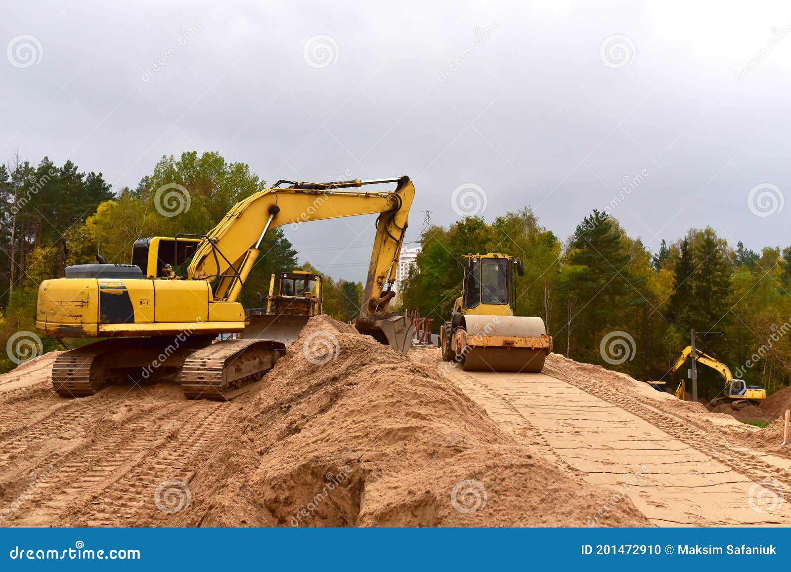 Excavator and Vibro Roller Soil Compactor at Road Construction and ...