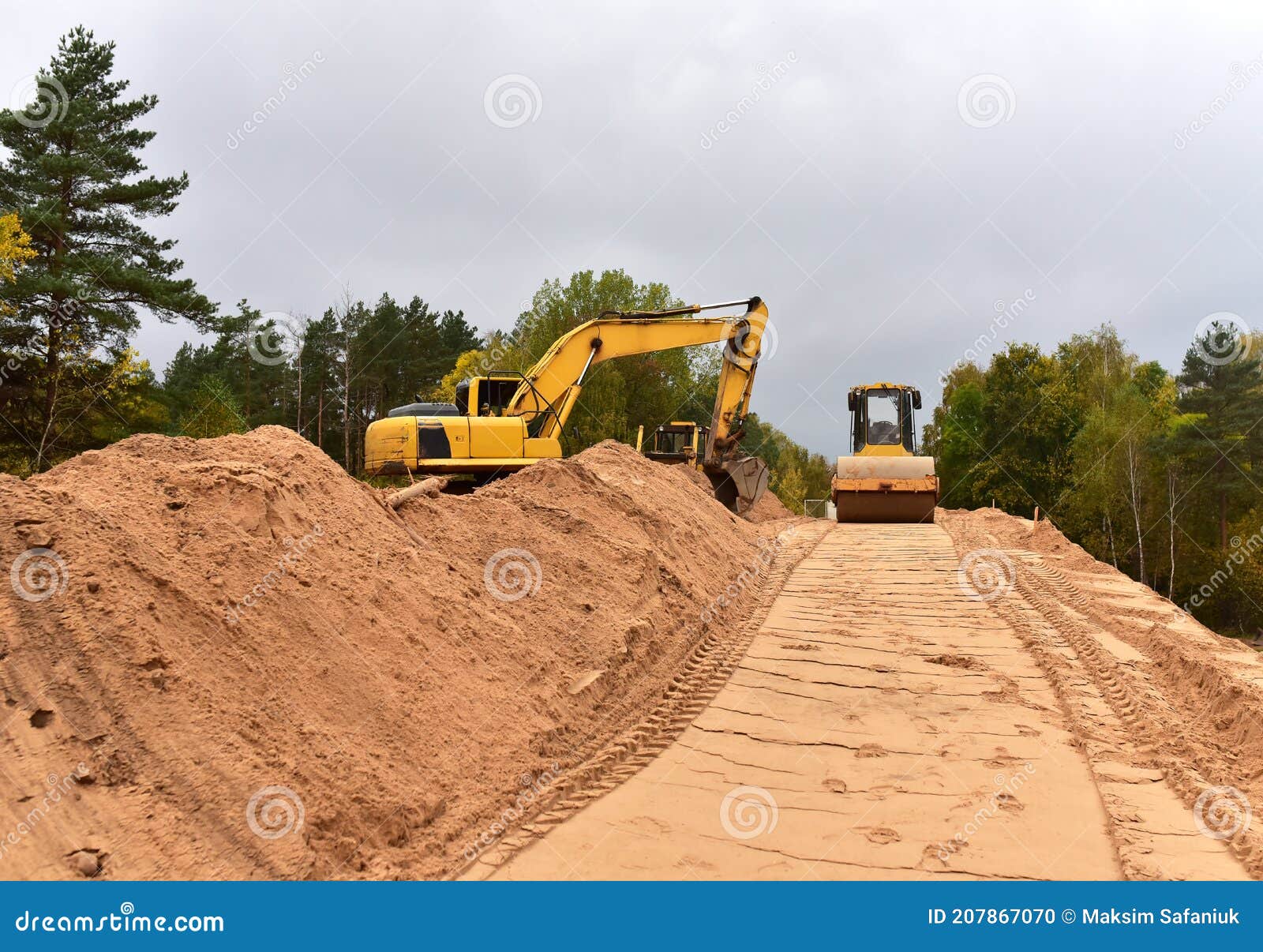 Leveling And Compaction Of Soil On The Construction Site. Modern Mini ...