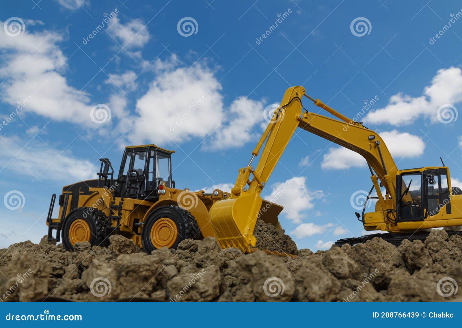 Excavator and Wheel Loader are Digging the Soil in the Construction ...