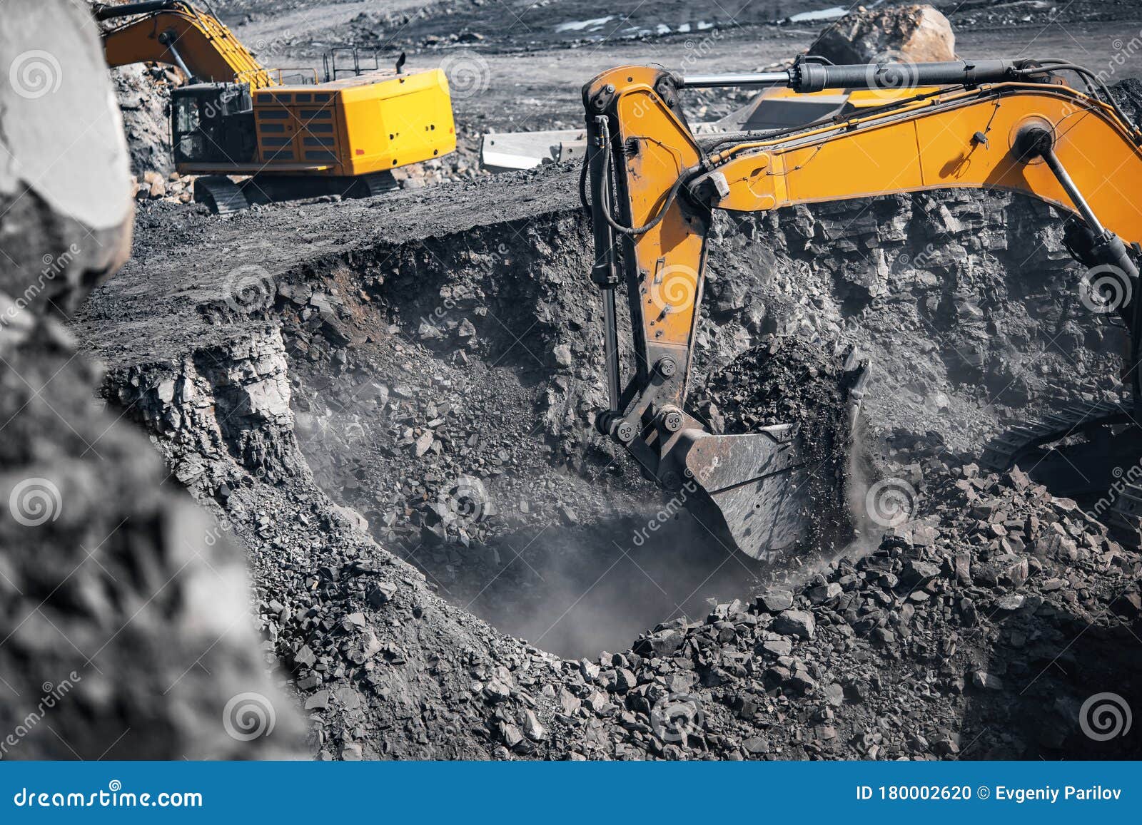 Excavator Work Loading of Coal into Yellow Mining Truck. Open Pit Mine ...