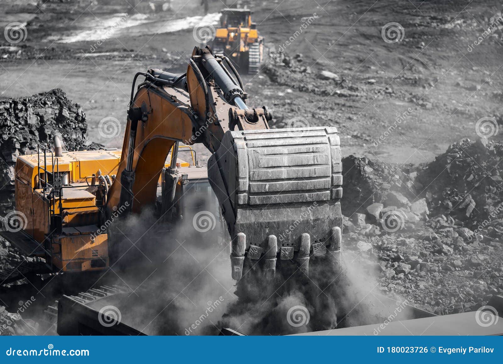 Excavator Work Loading of Coal into Yellow Mining Truck. Open Pit Mine ...
