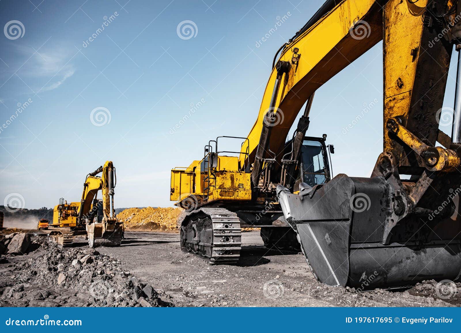 Excavator Work Loading of Coal into Yellow Mining Truck. Open Pit Mine ...
