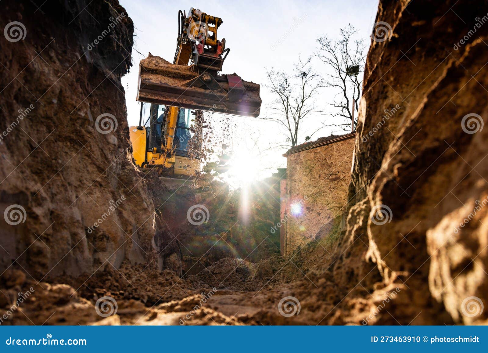Excavator at Work Seen from Inside the Trench Stock Photo - Image of ...