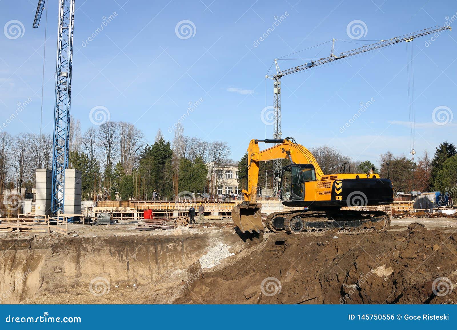 Excavator and Workers on Construction Site Stock Photo - Image of ...