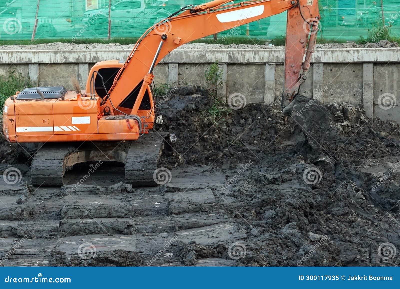 Excavator Working on the Construction of a New Road in the City ...