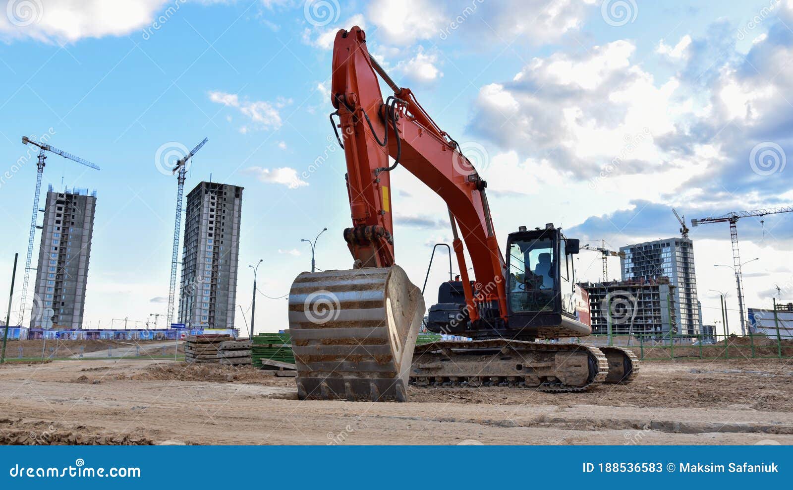 Excavator Working at Construction Site. Backhoe during Earthworks Stock ...