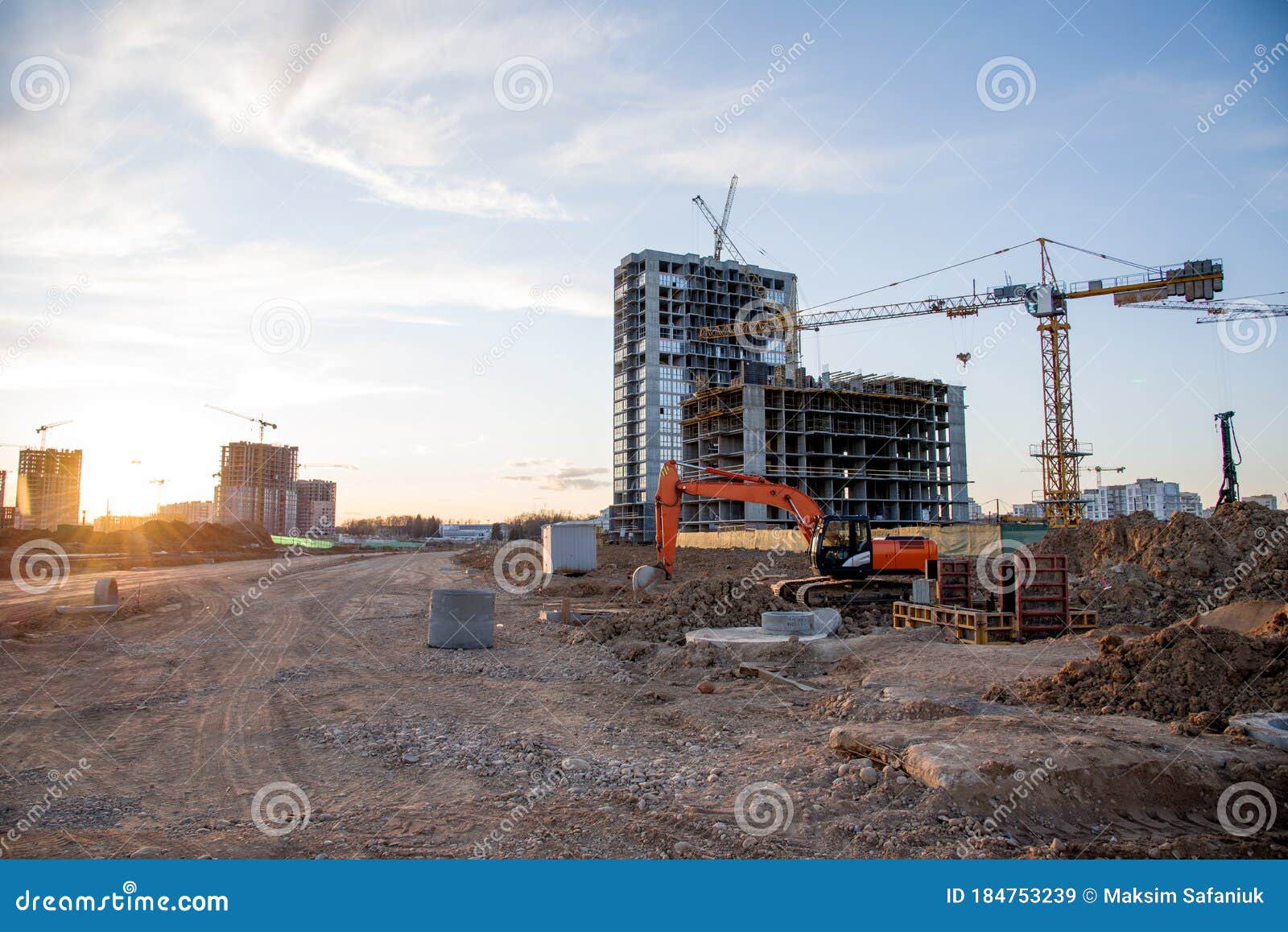 Excavator Working at Construction Site on Earthworks. Backhoe Digging ...