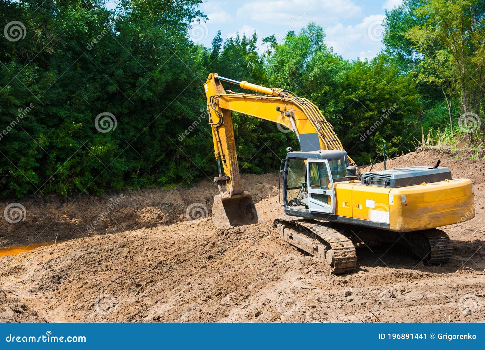 An Excavator Working on a Construction Site Stock Image - Image of ...