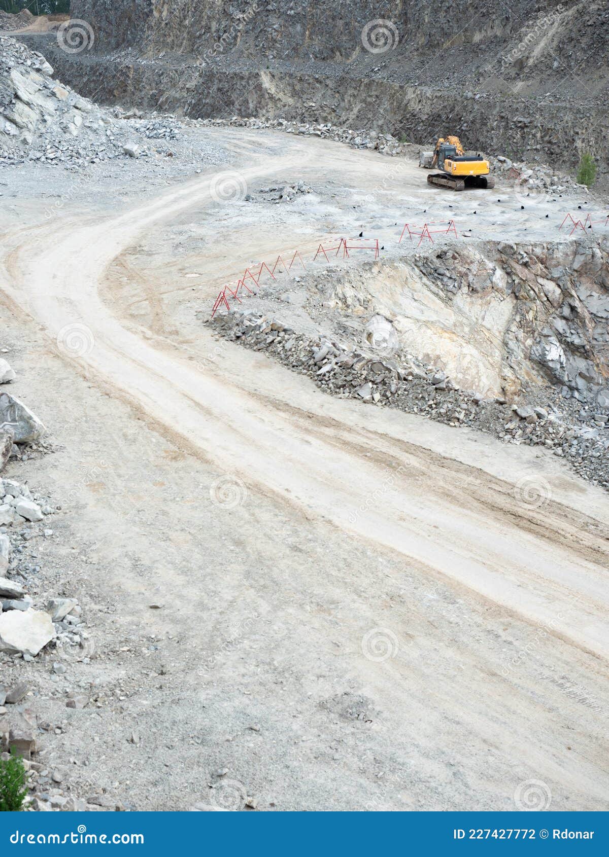 Excavator Working on Earthmoving at Open Pit Mining Stock Photo - Image ...