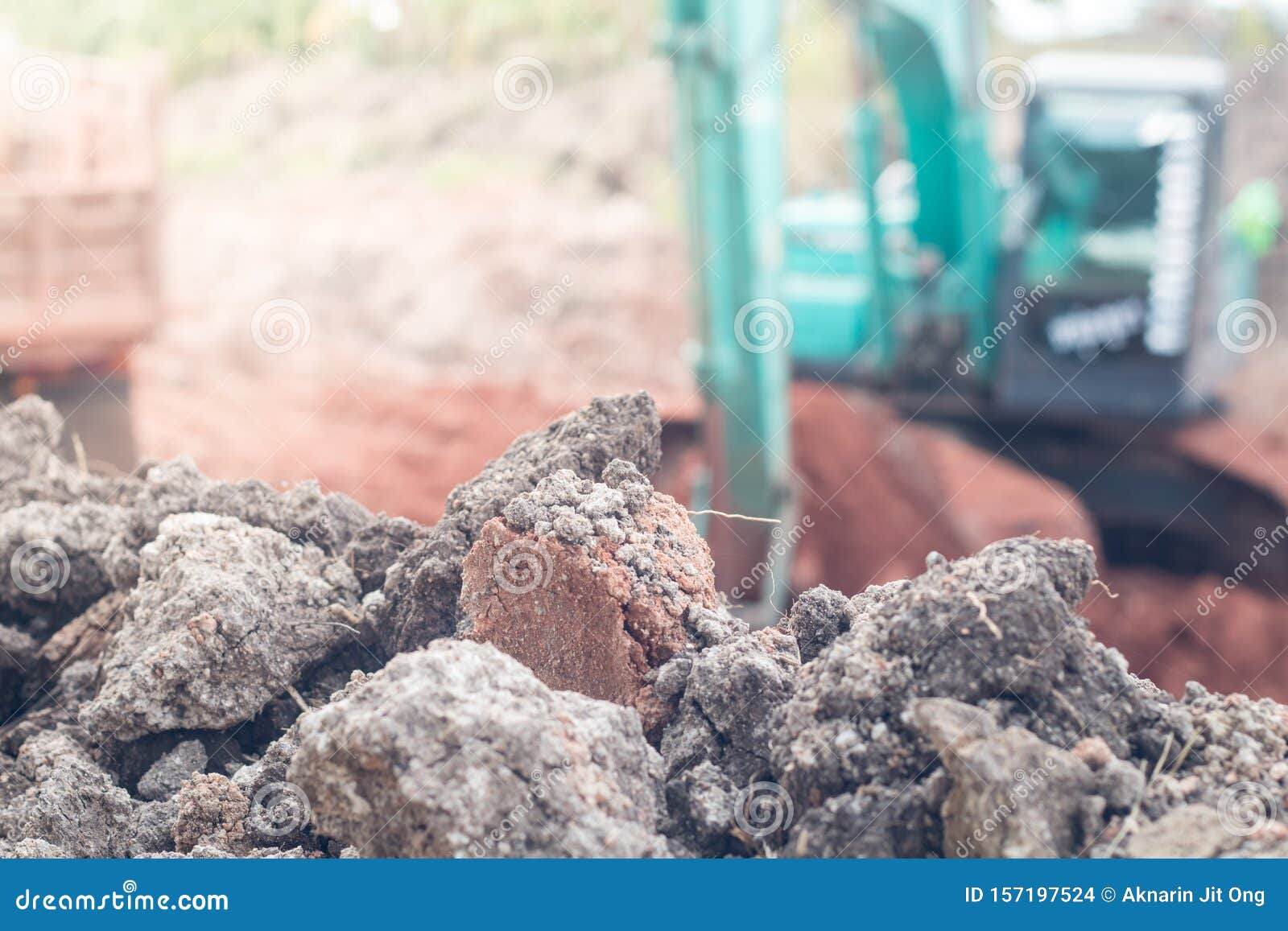 Excavator working on field stock photo. Image of yellow - 157197524