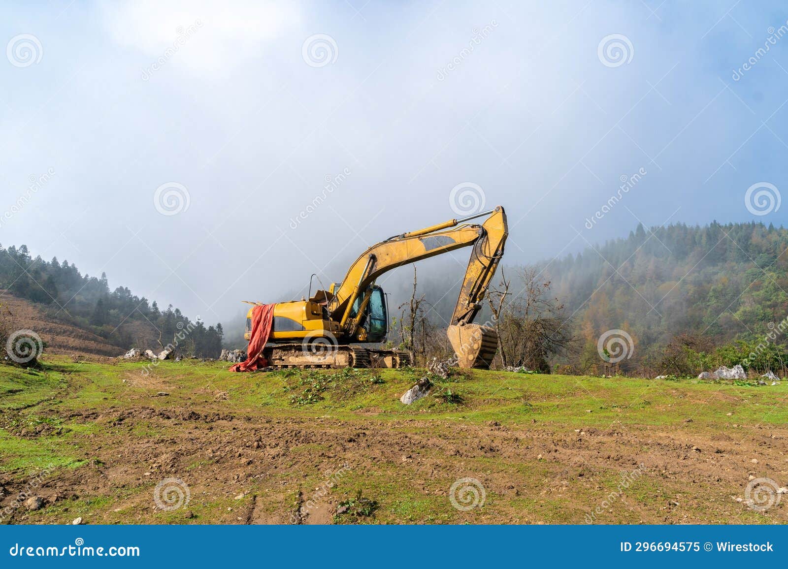 Excavator Working in the Field and Digging the Earth Stock Image ...