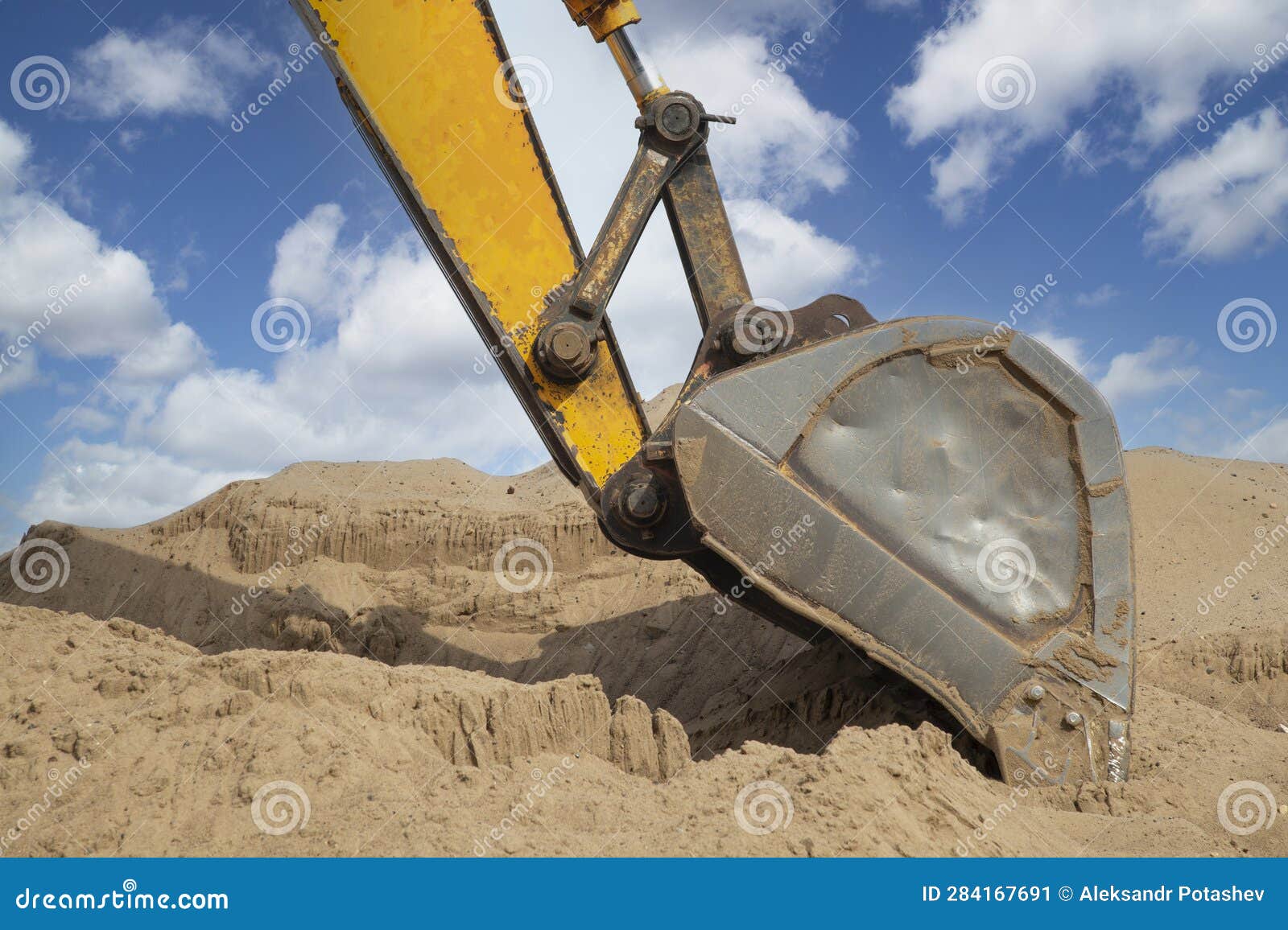 Excavator. the Excavator is Working on Loading Sand Stock Image - Image ...