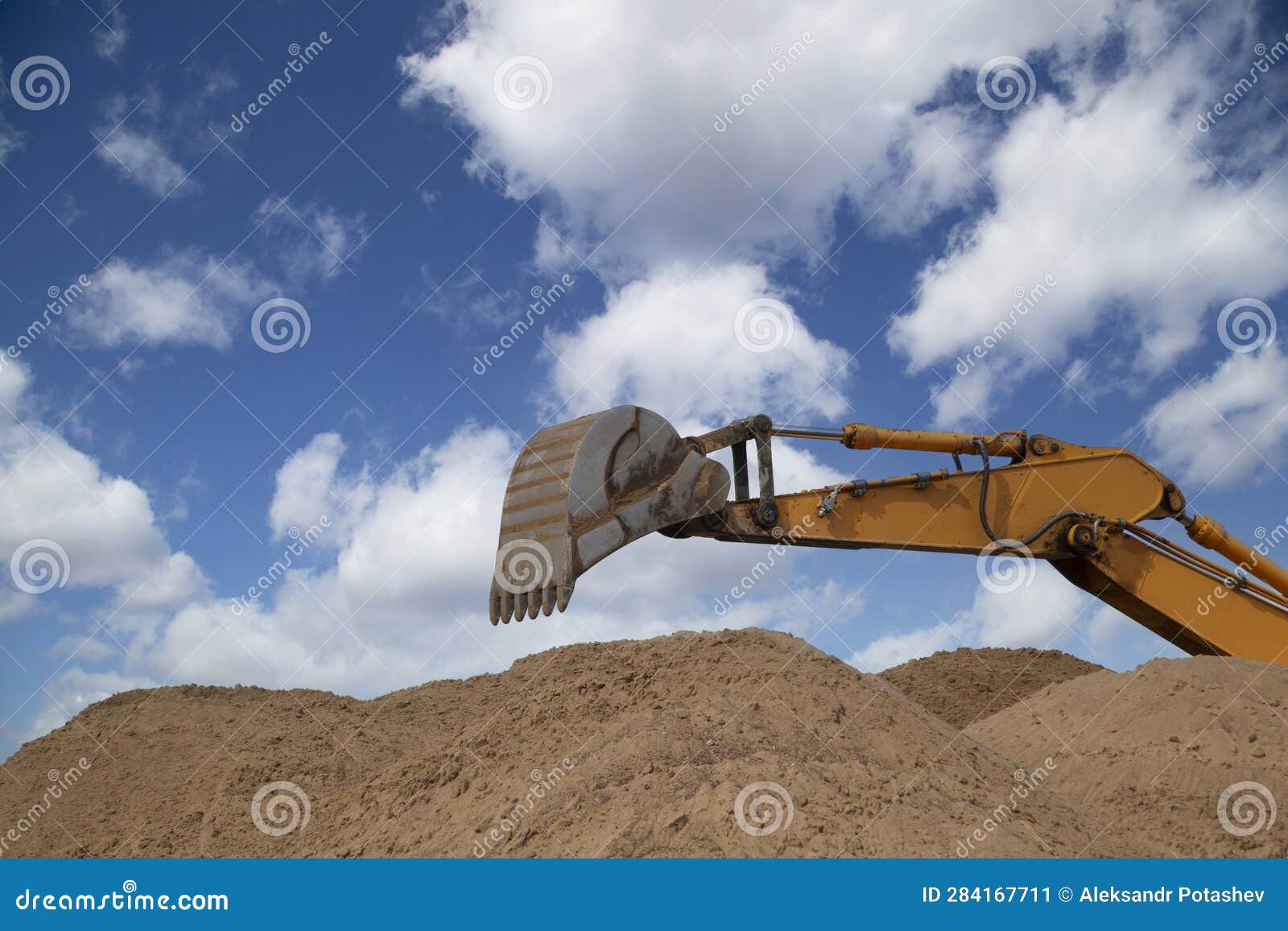 Excavator. the Excavator is Working on Loading Sand Stock Image - Image ...