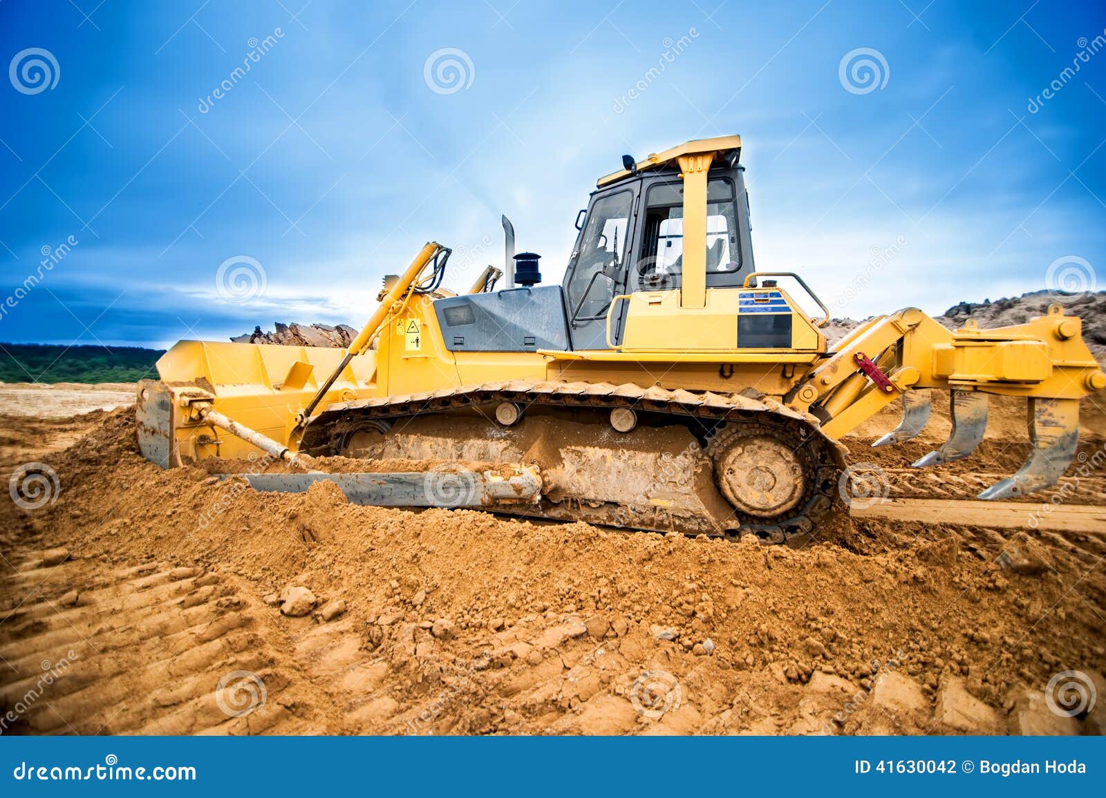 Excavator Working and Moving Earth in Construction Site Stock Photo ...
