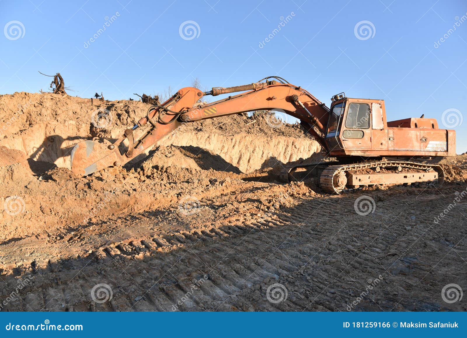 Excavator Working at Open Pit Mining. Backhoe Digs Ground in Sand ...