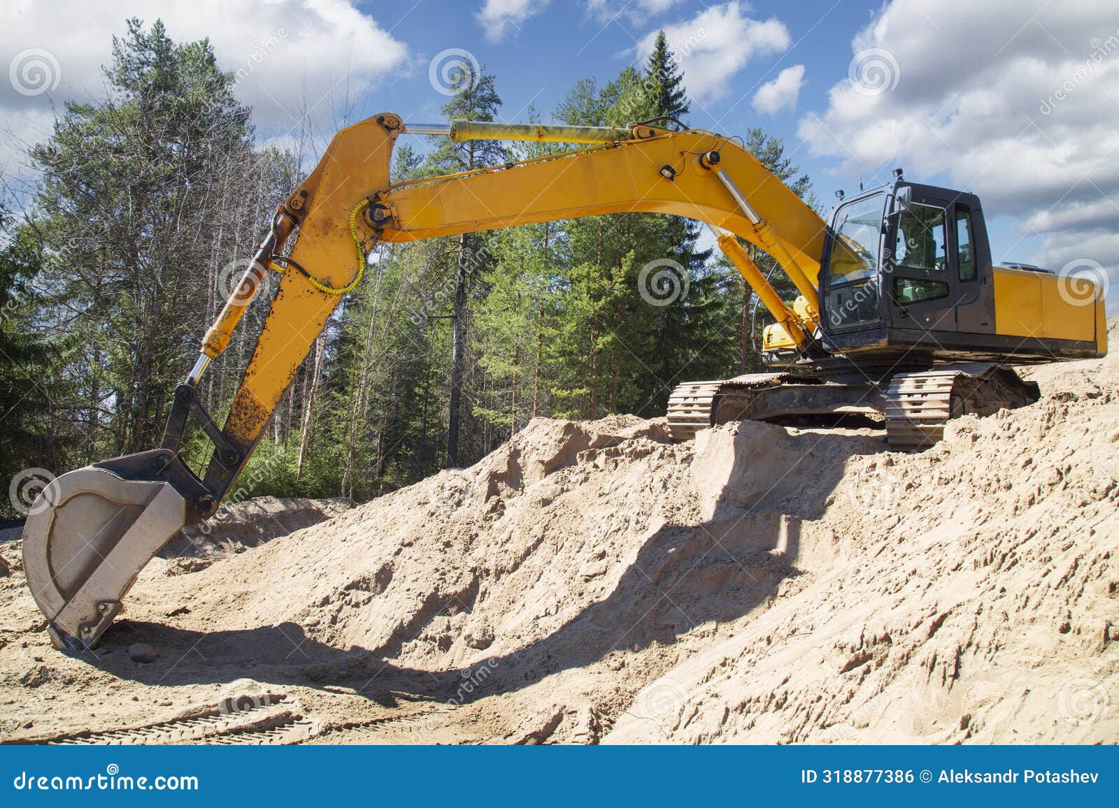The Excavator is Working in a Sand Loading Quarry Stock Photo - Image ...