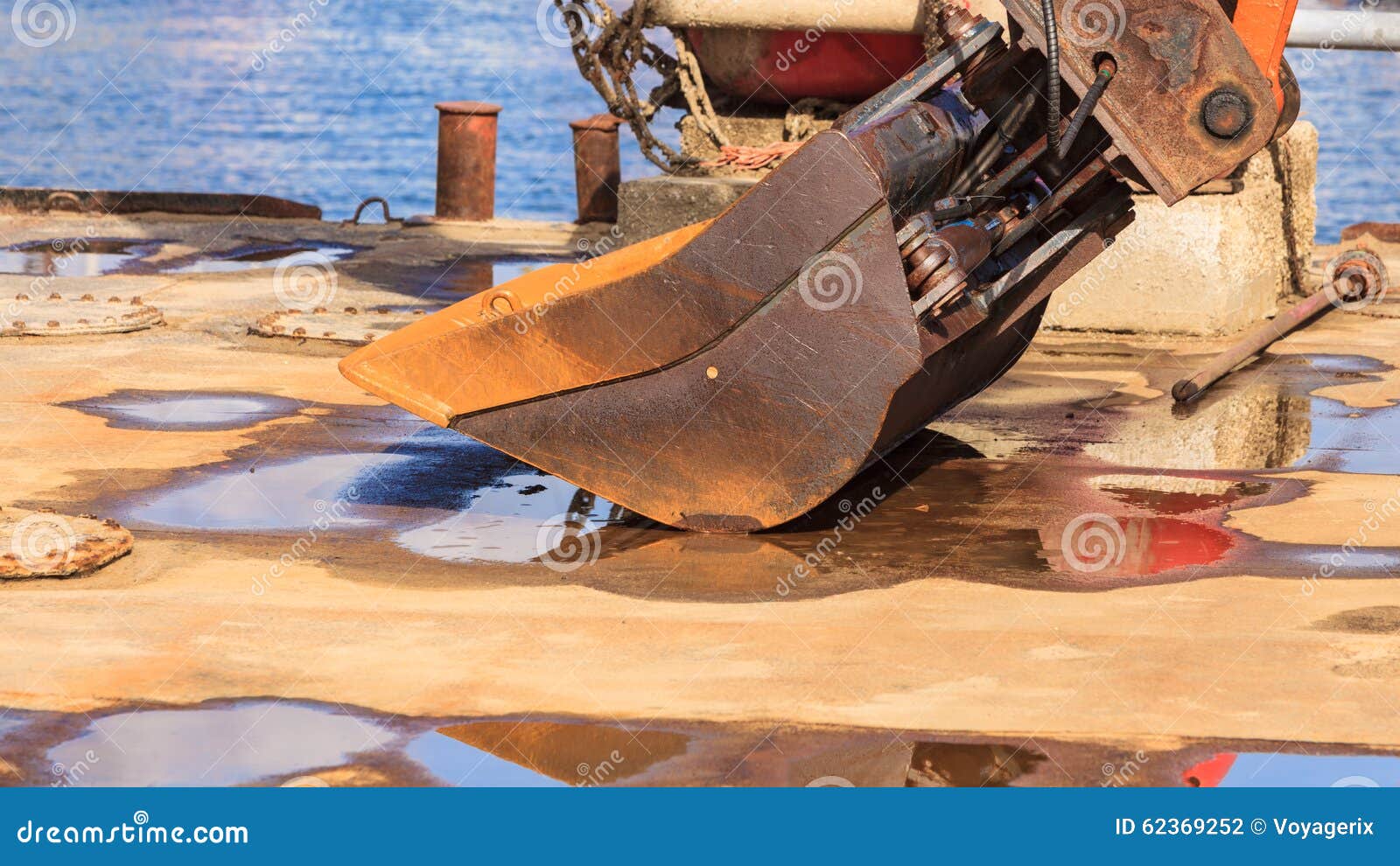Excavator working at sea. stock photo. Image of build - 62369252