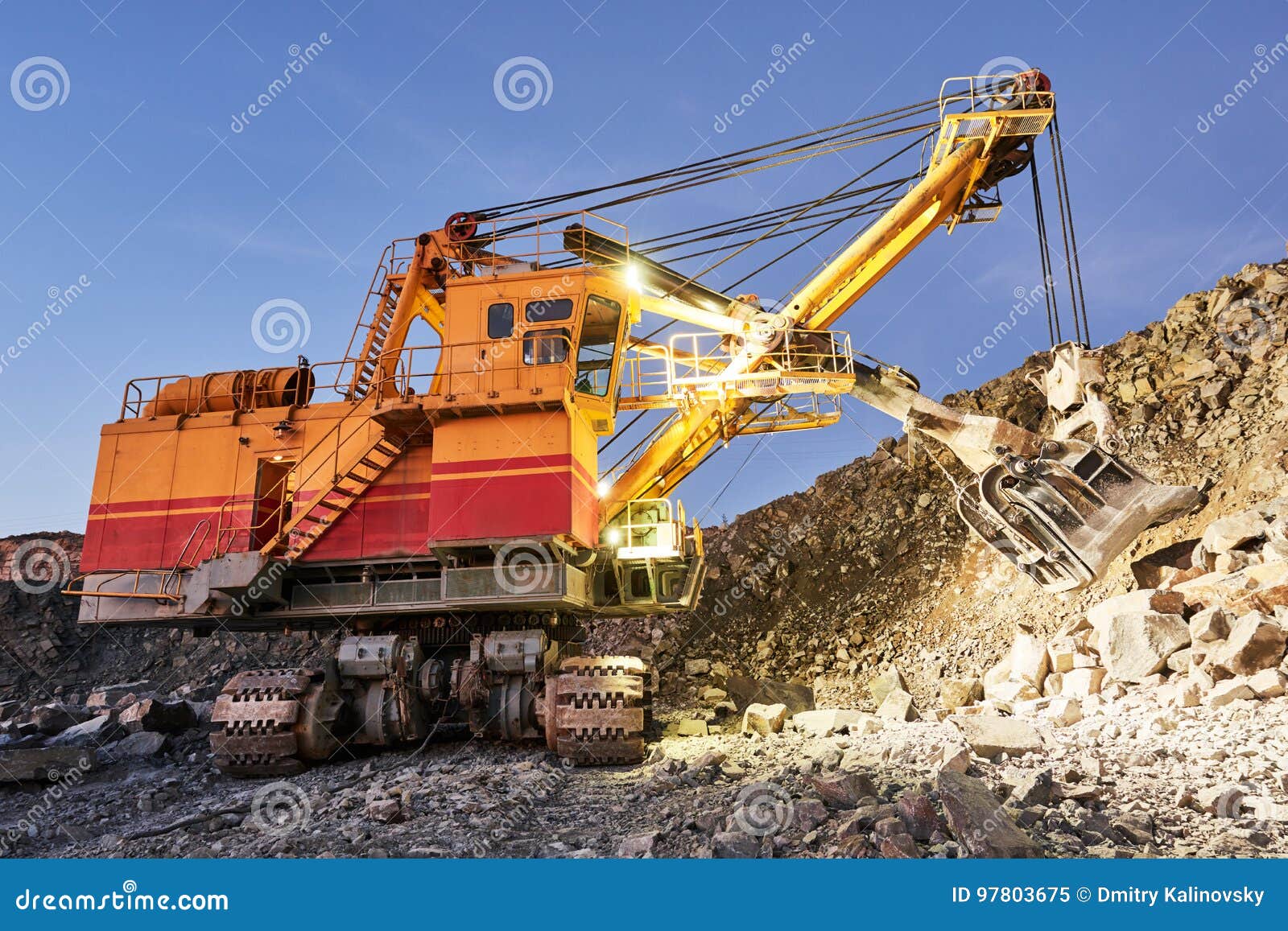 Excavator Works with Granite or Ore at Opencast Mining Stock Image ...