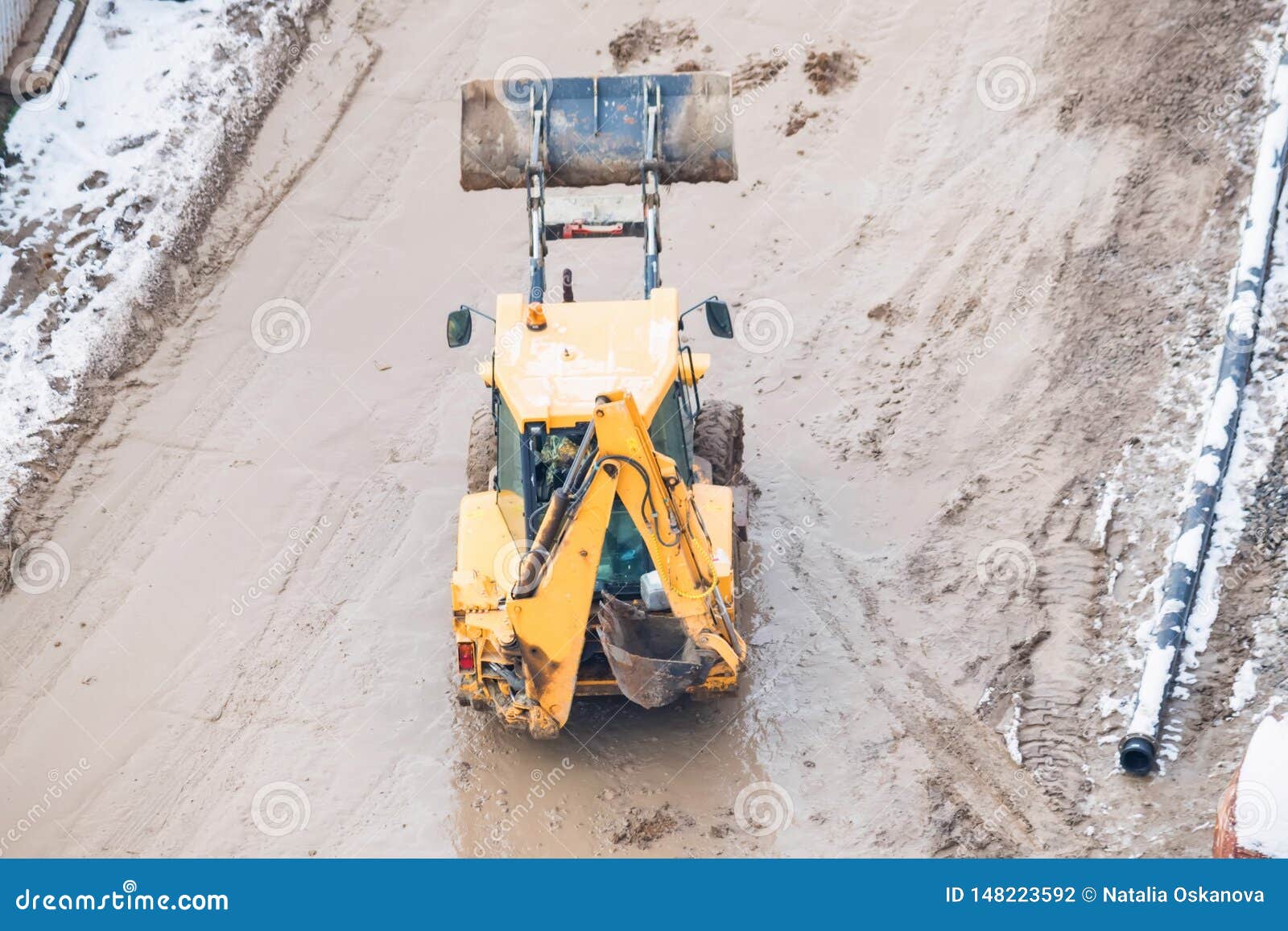 Excavator Works in Mud on Construction Site Stock Photo - Image of ...