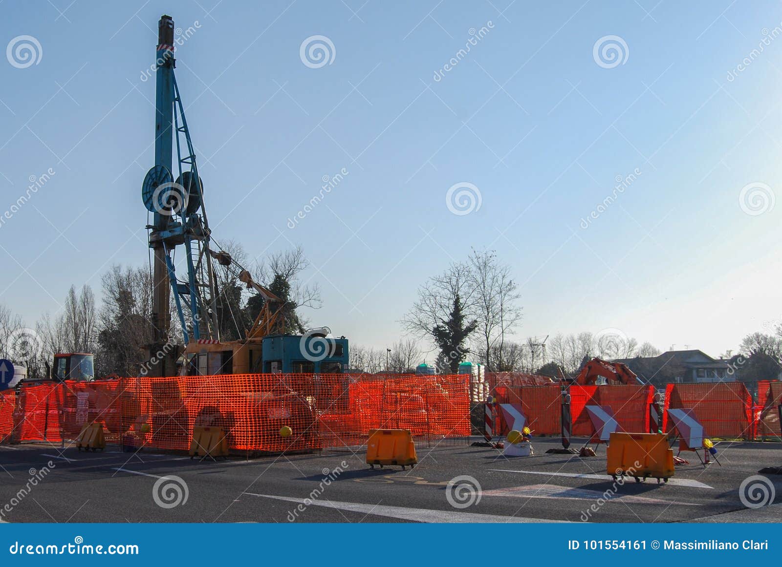 Excavators Machine on a Construction Site Assembly a Huge Mold with ...
