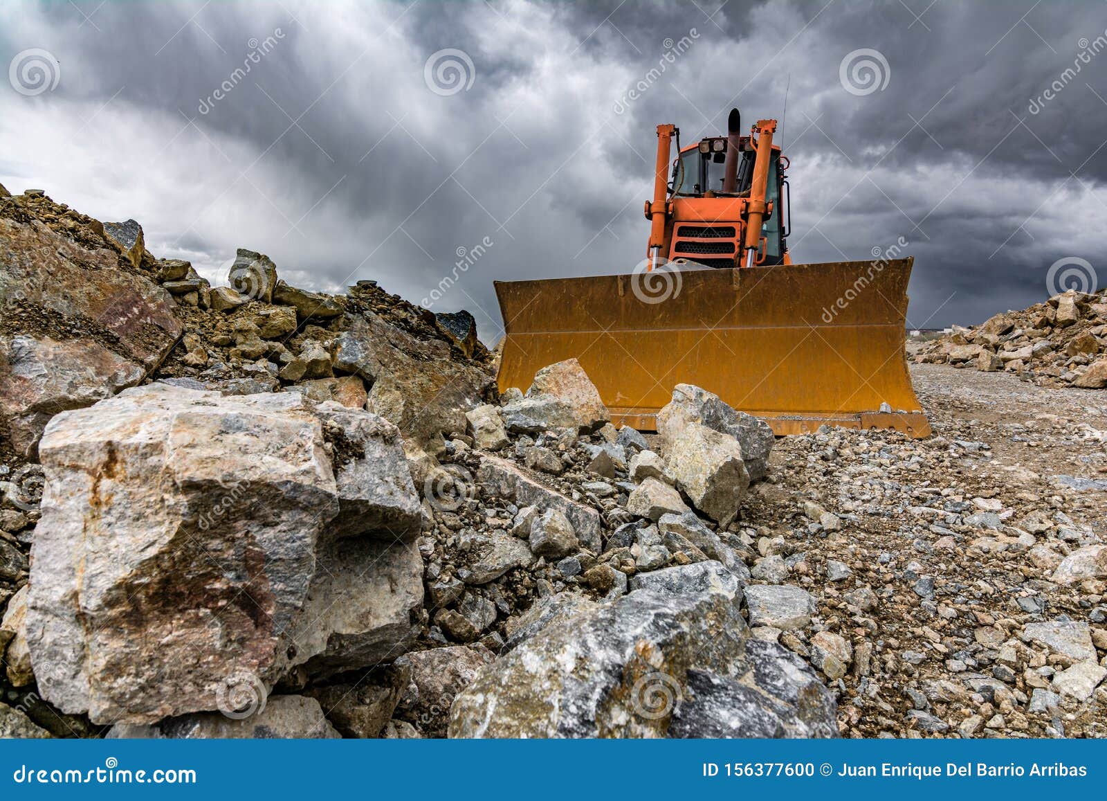 Excavators Removing Stone in the Construction Works of a Road Stock ...