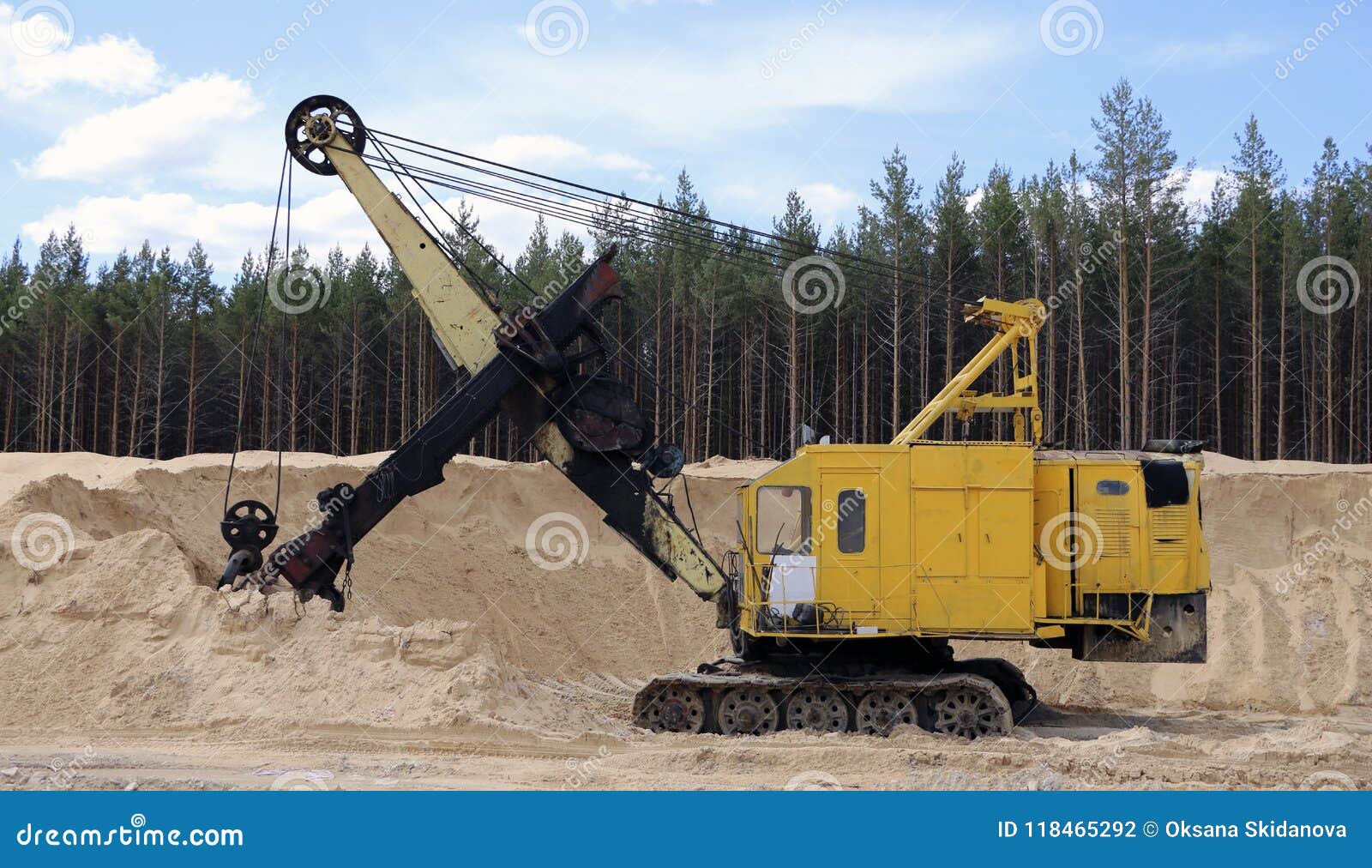 Excavators at a Sand Quarry. Big Orange Digger in Open Sand Mine is ...