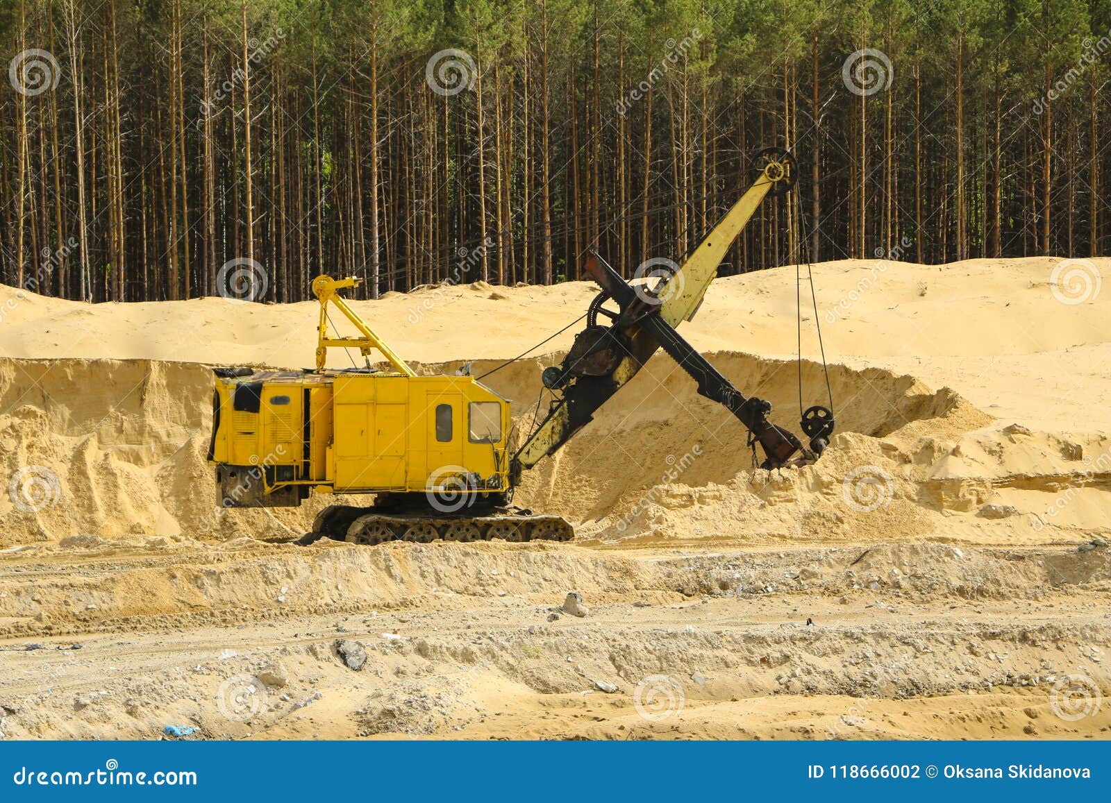 Excavators at a Sand Quarry. Big Orange Digger in Open Sand Mine is ...